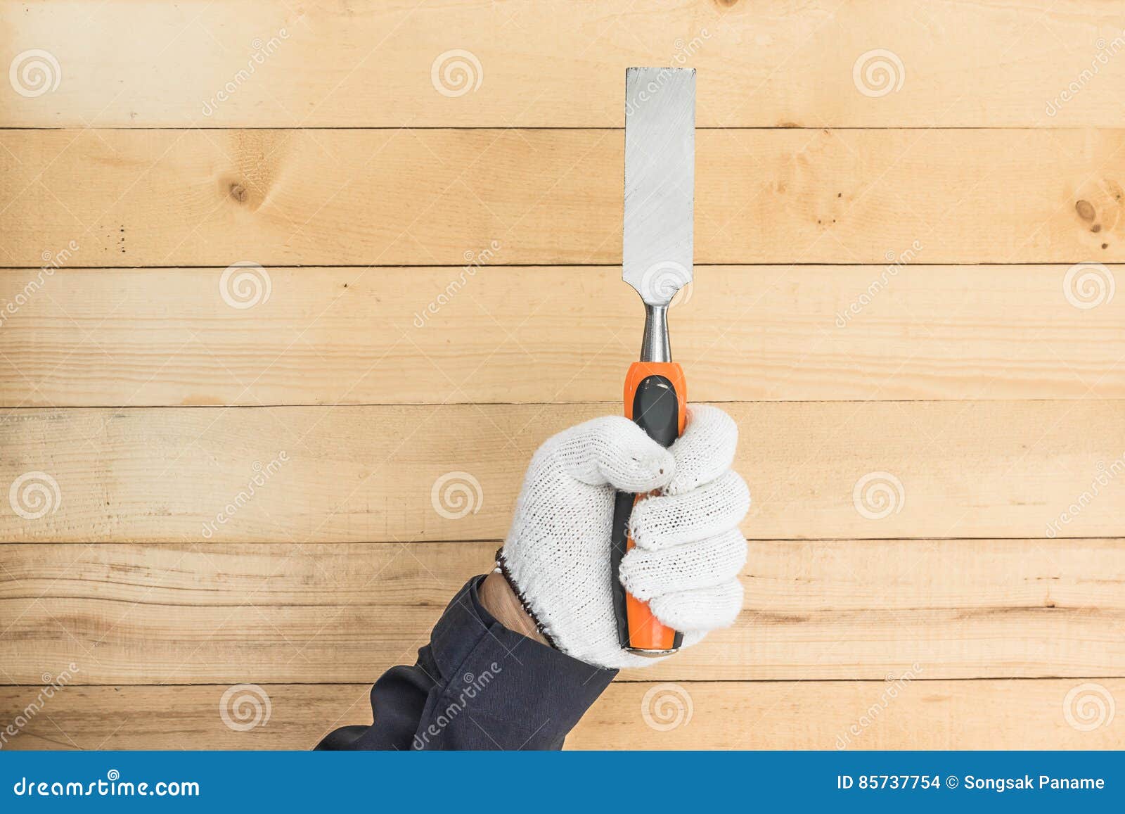 Hand in Glove Holding Chisel Stock Photo - Image of utensil ...