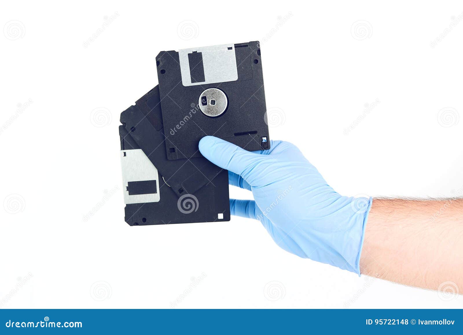 Hand with Gloves Holding Old Floppy Disks Stock Photo - Image of data ...