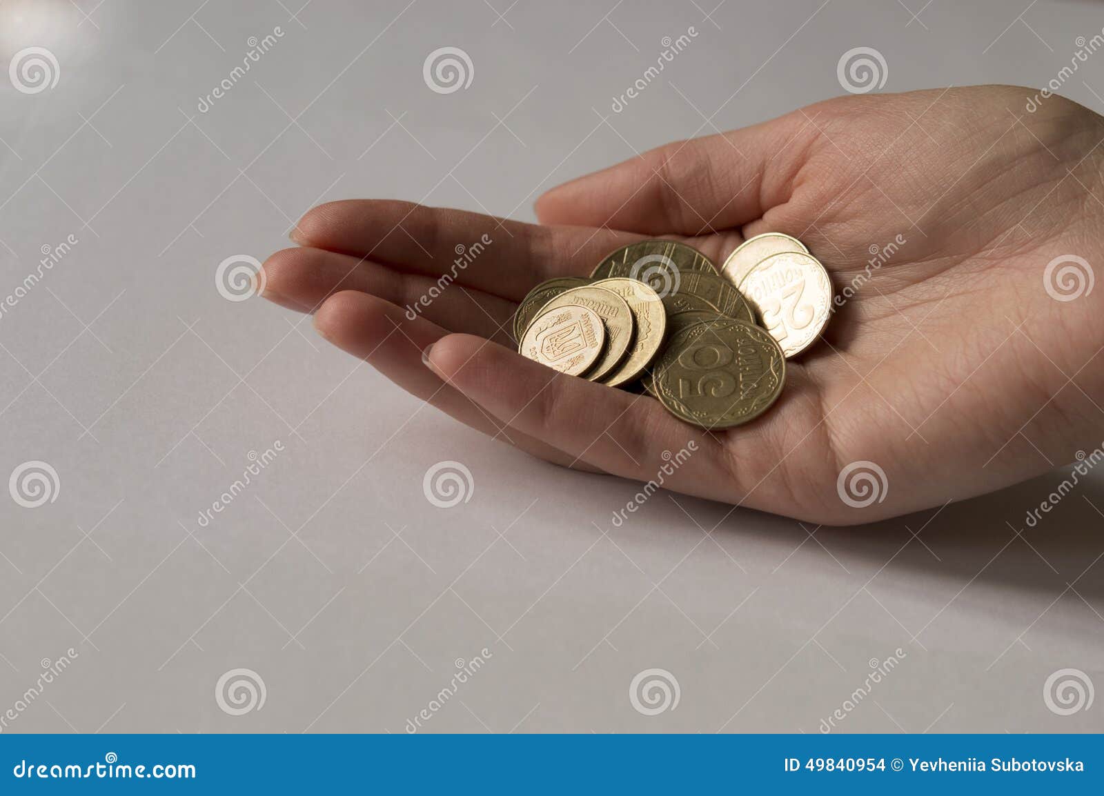 Hand with gold coins stock photo. Image of paying, concept - 49840954