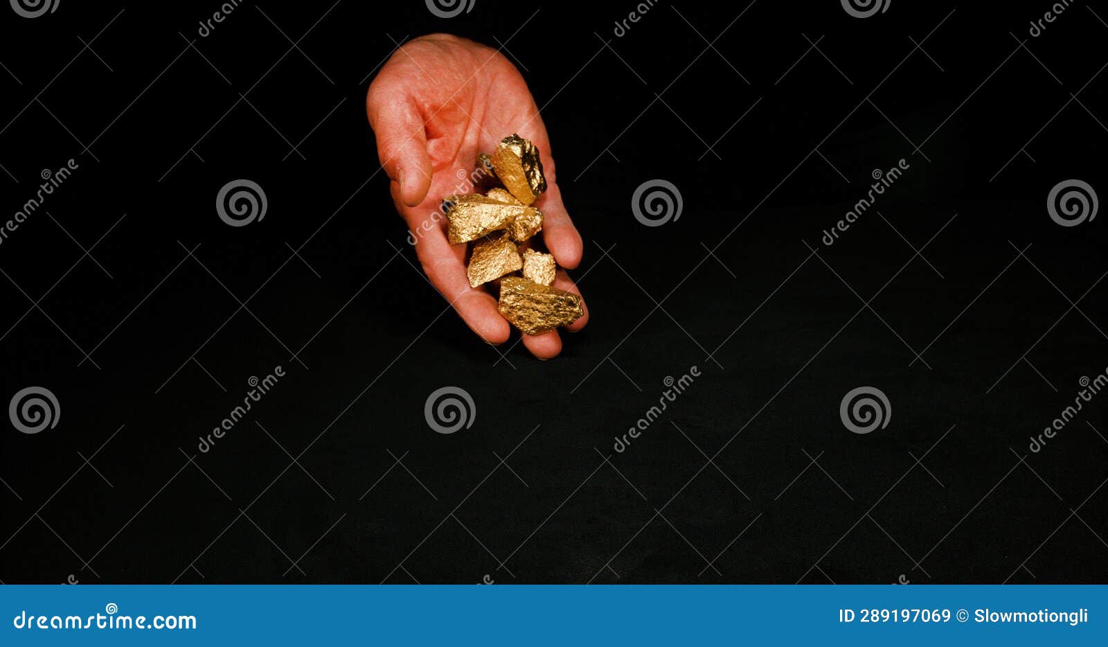 Hand and Gold Nuggets, Nugget, Falling on Black Background Stock Image ...