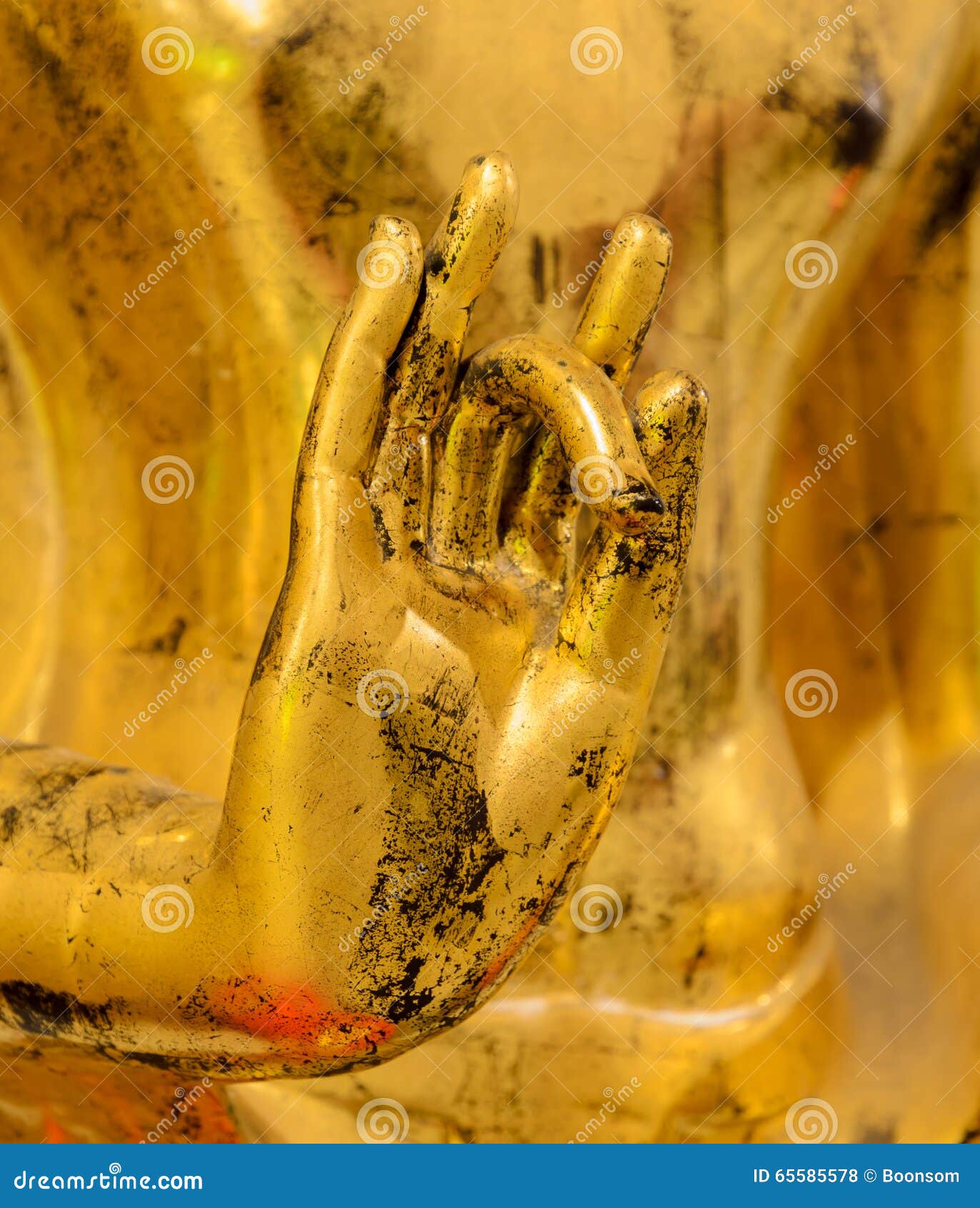 Hand of the golden buddha stock photo. Image of holy - 65585578