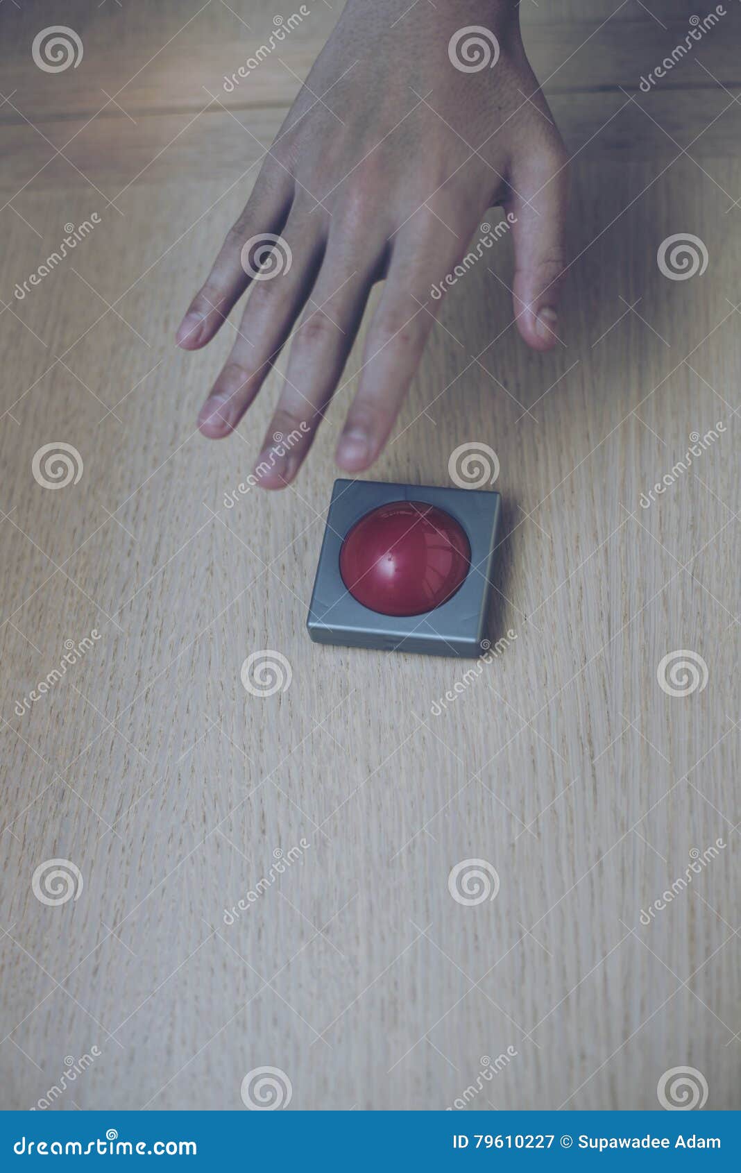 Hand Grab for the Red Button on Wood Table. Stock Image - Image of ...