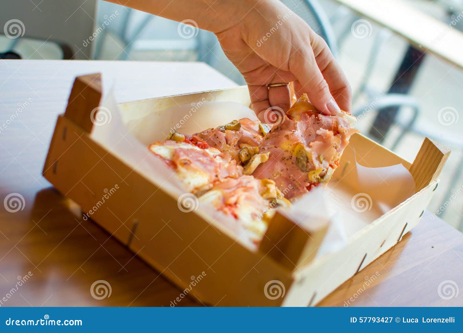 Hand grab a slice of pizza stock image. Image of tomato - 57793427