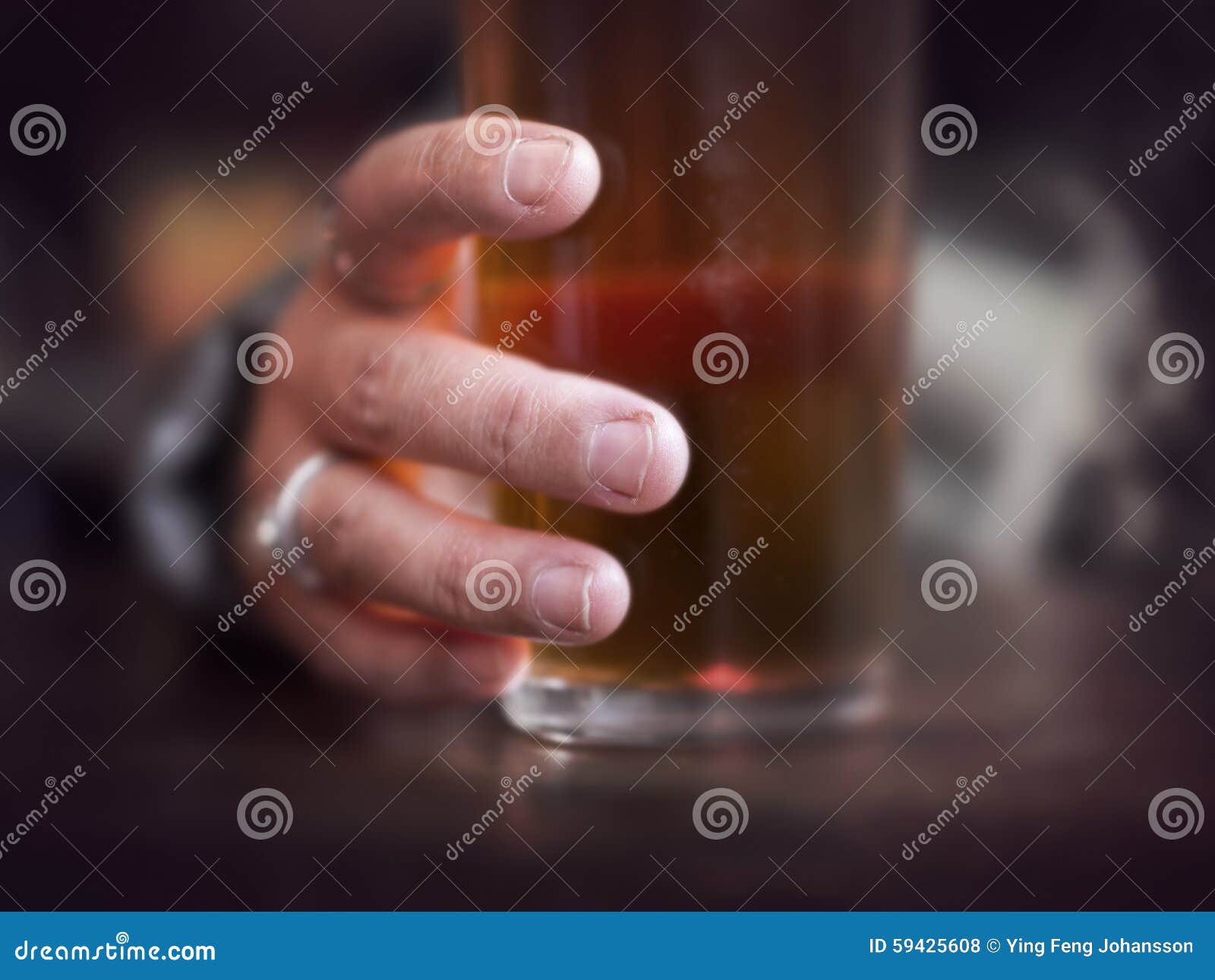 Hand Grabbing Glass of Beer Stock Photo - Image of glass, grip: 59425608