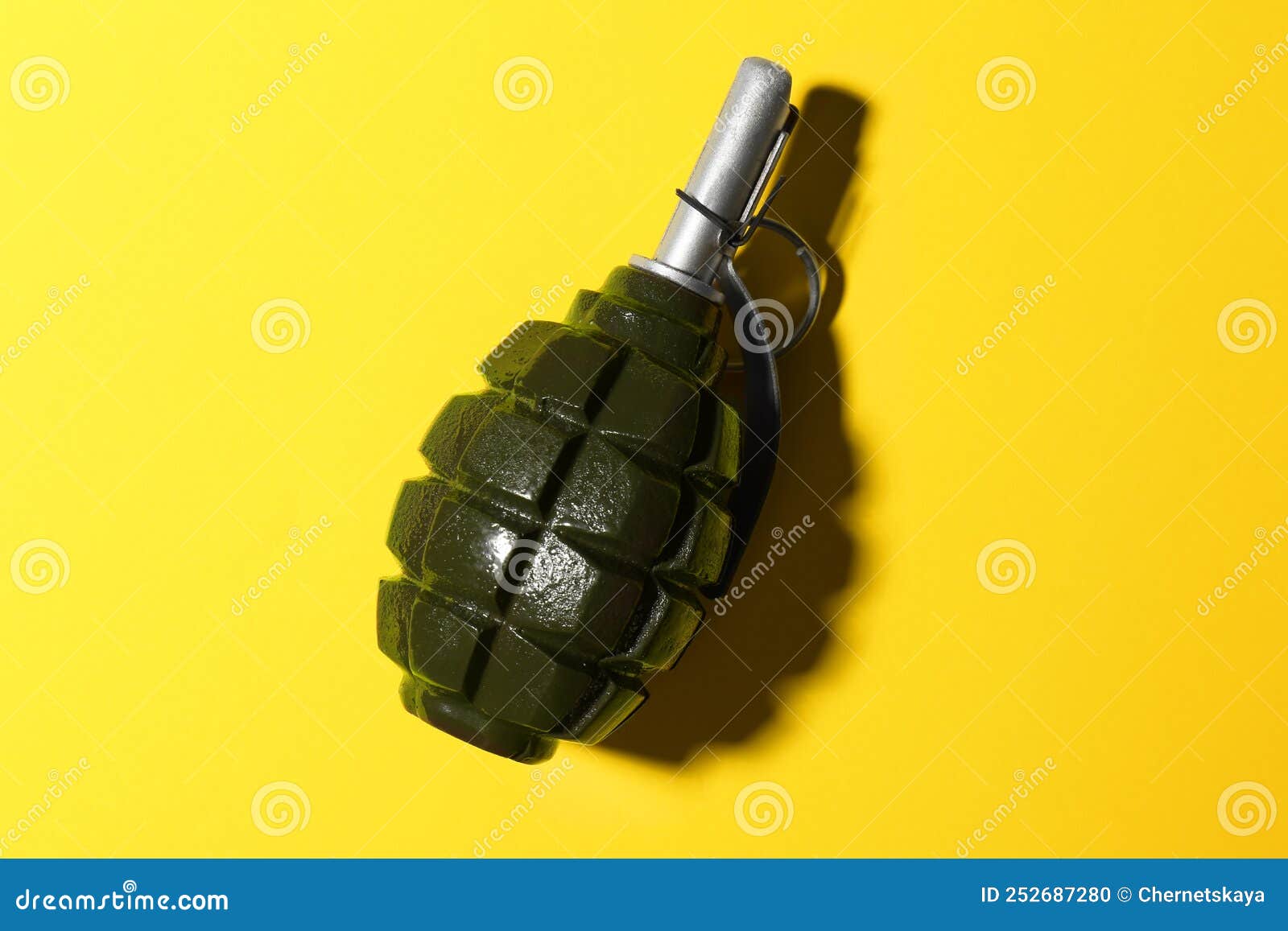 Hand Grenade on Yellow Background, Top View Stock Photo - Image of ...