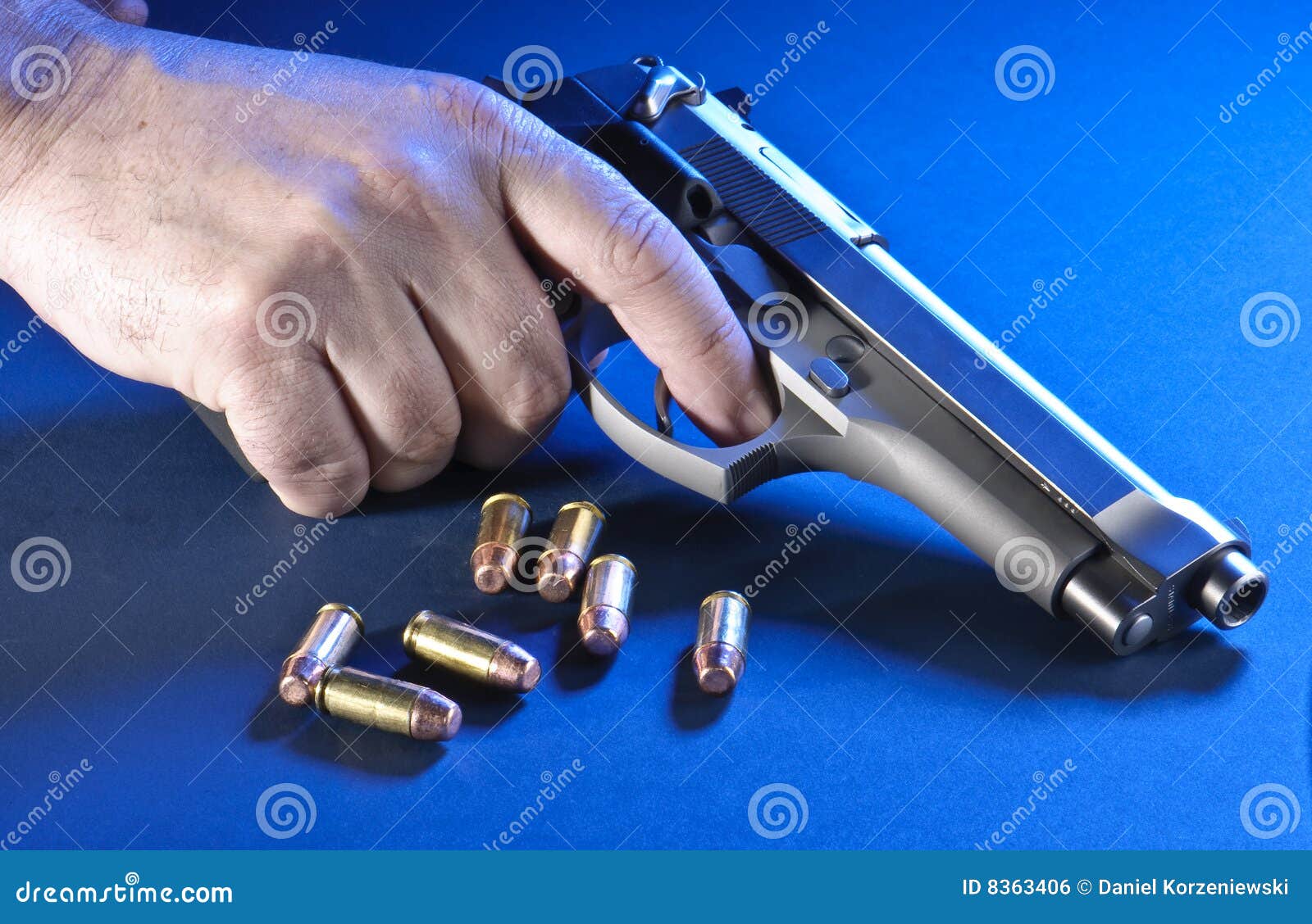 Hand and Gun stock photo. Image of revolver, bullet, ammo - 8363406