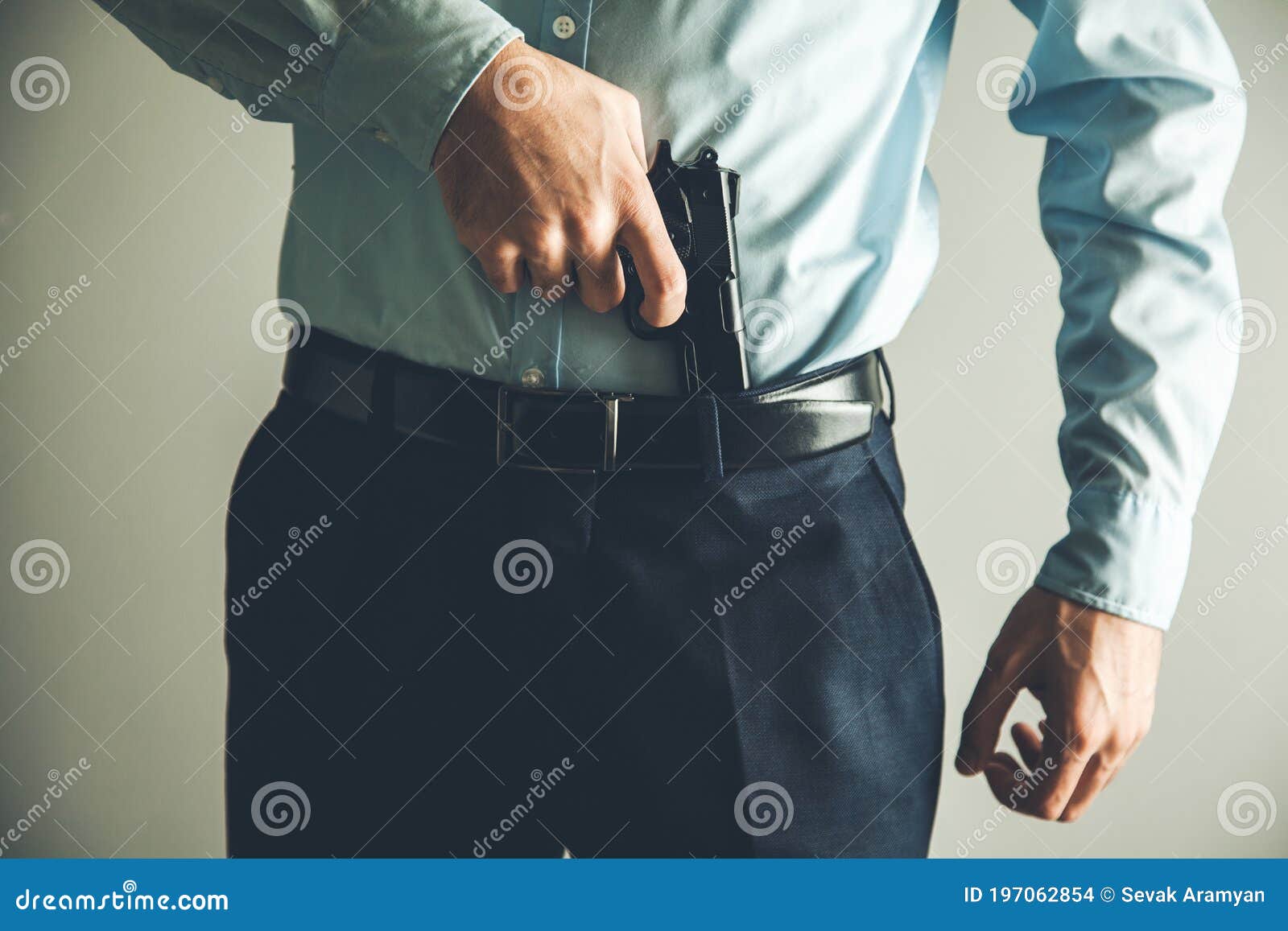 Hand gun into pants stock photo. Image of danger, killer - 197062854