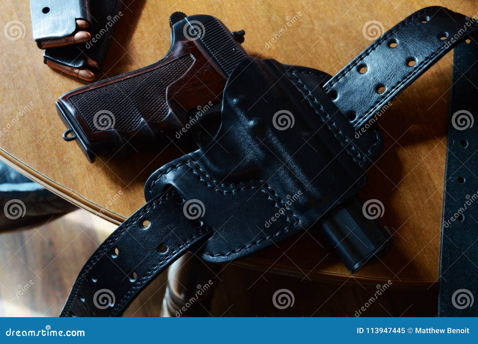Hand Gun on Table stock image. Image of handle, magazine - 113947445