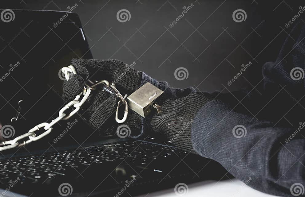 Hand of Hacker Unlock Computer. Dangerous Hacker Stealing Data Stock ...
