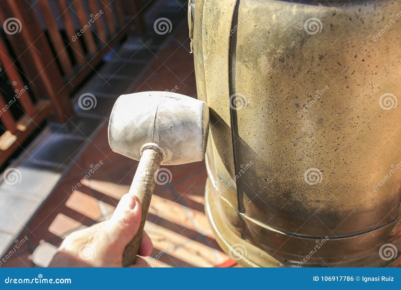 Hand with a Hammer with a Bell Stock Photo - Image of classic, antique ...