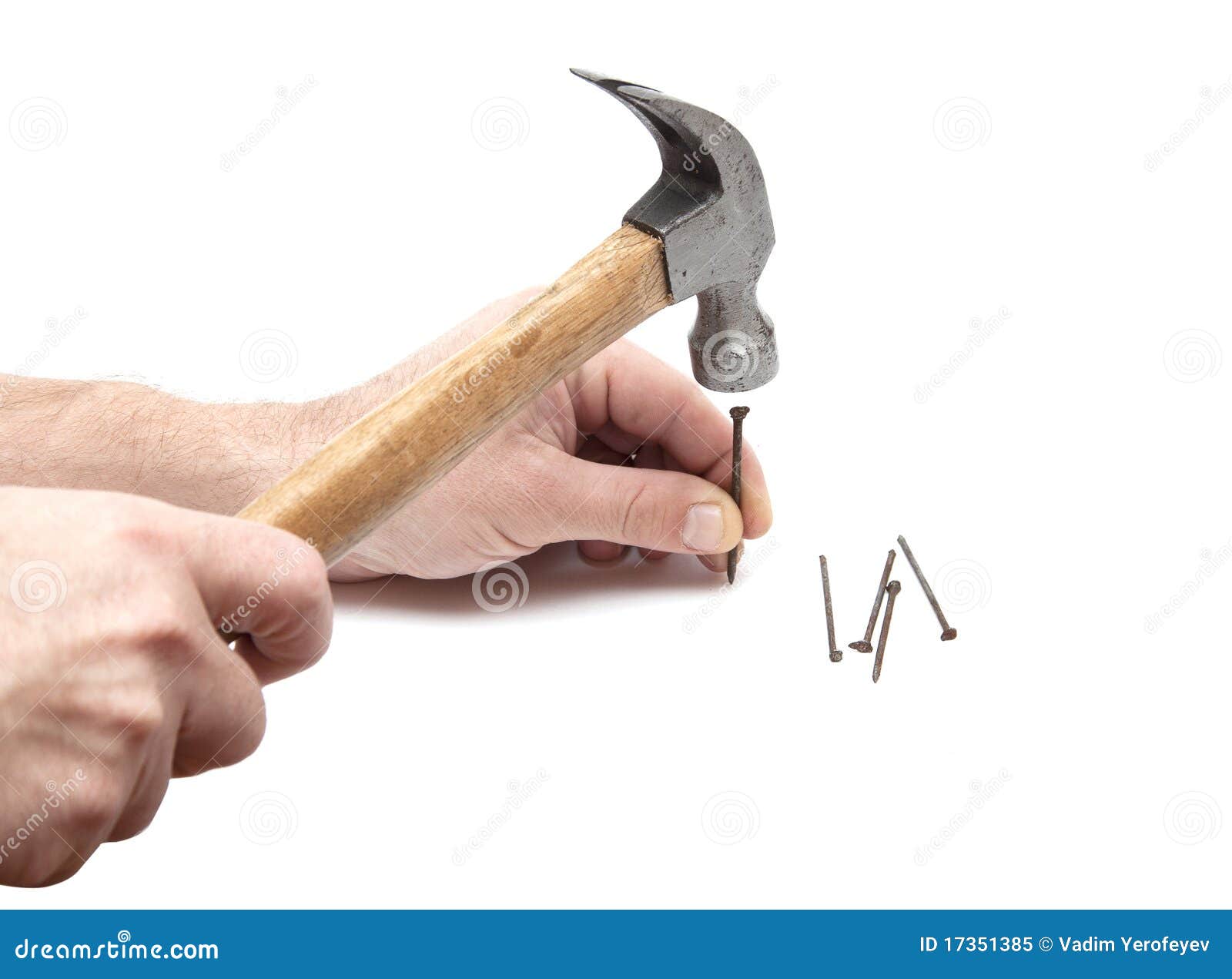 Hand with hammer nailing stock image. Image of iron, handle - 17351385