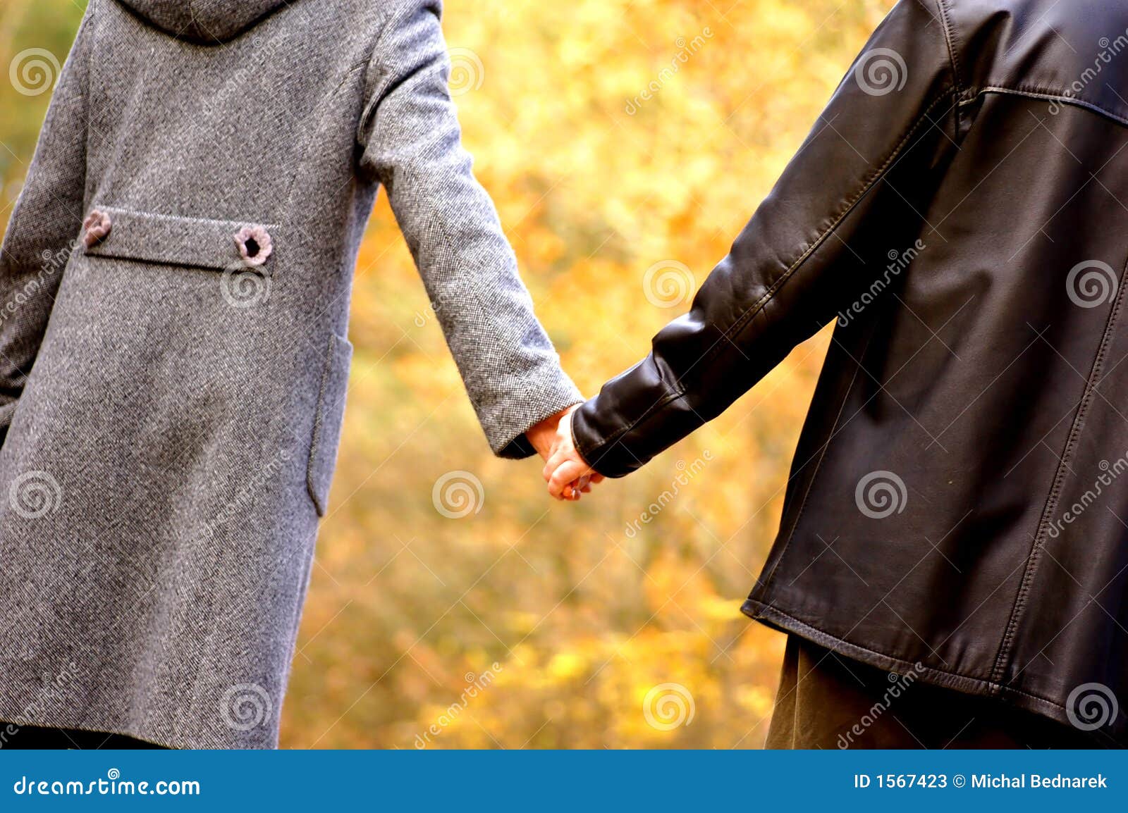 Hand-in-hand stock image. Image of couple, walk, middleage - 1567423