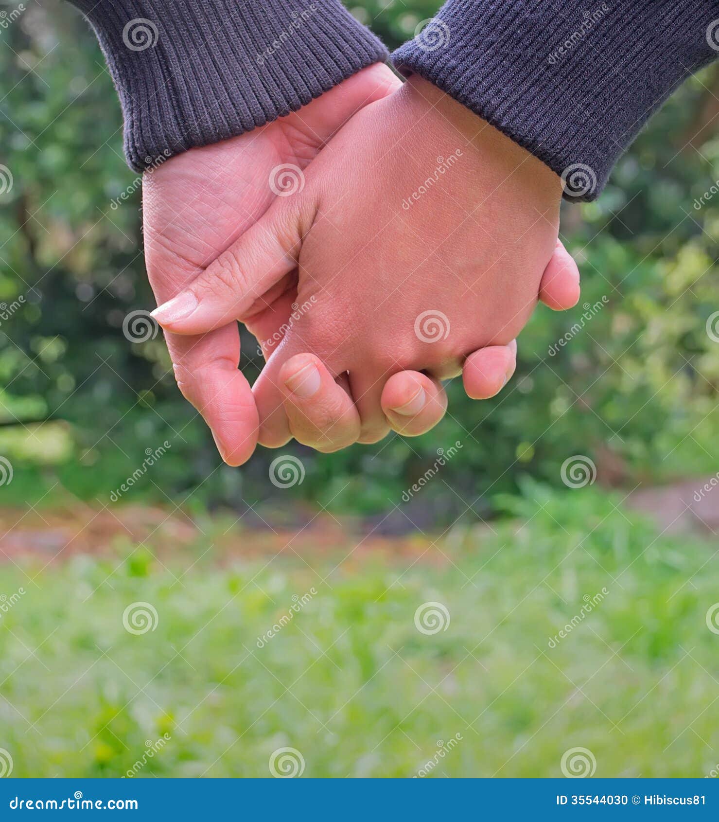 Hand in hand with love stock photo. Image of couple, outside - 35544030