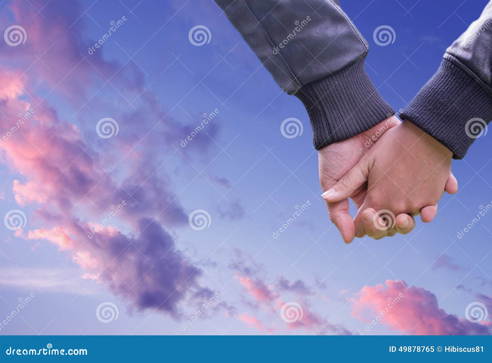 Hand in hand at sunset stock image. Image of feeling - 49878765