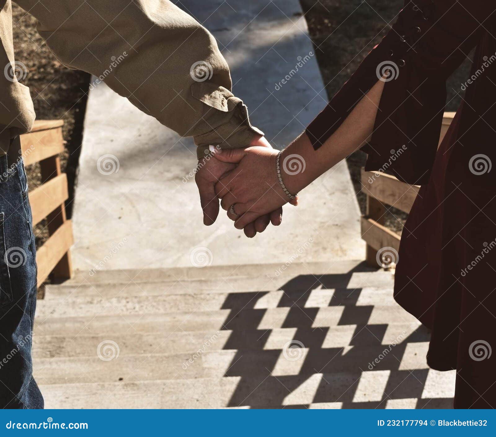 Hand in hand we walk stock photo. Image of life, walk - 232177794