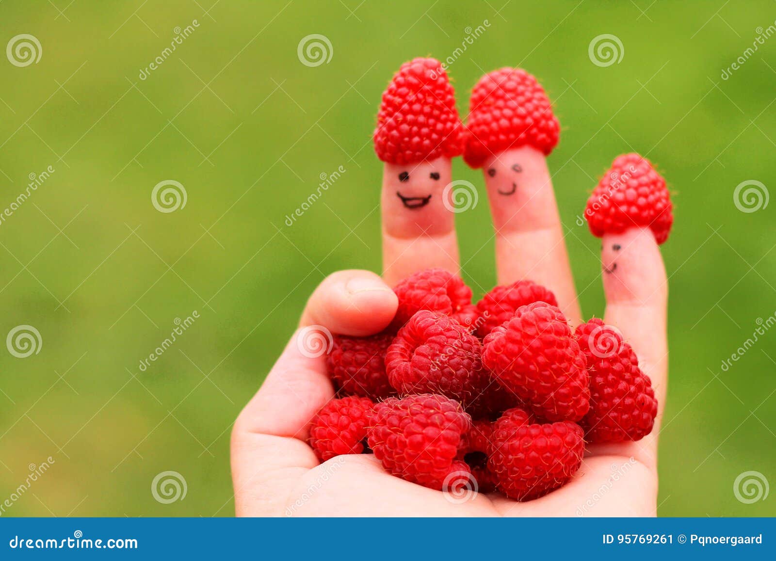 Hand with Happy Fingers Holding Raspberries Stock Image - Image of face ...