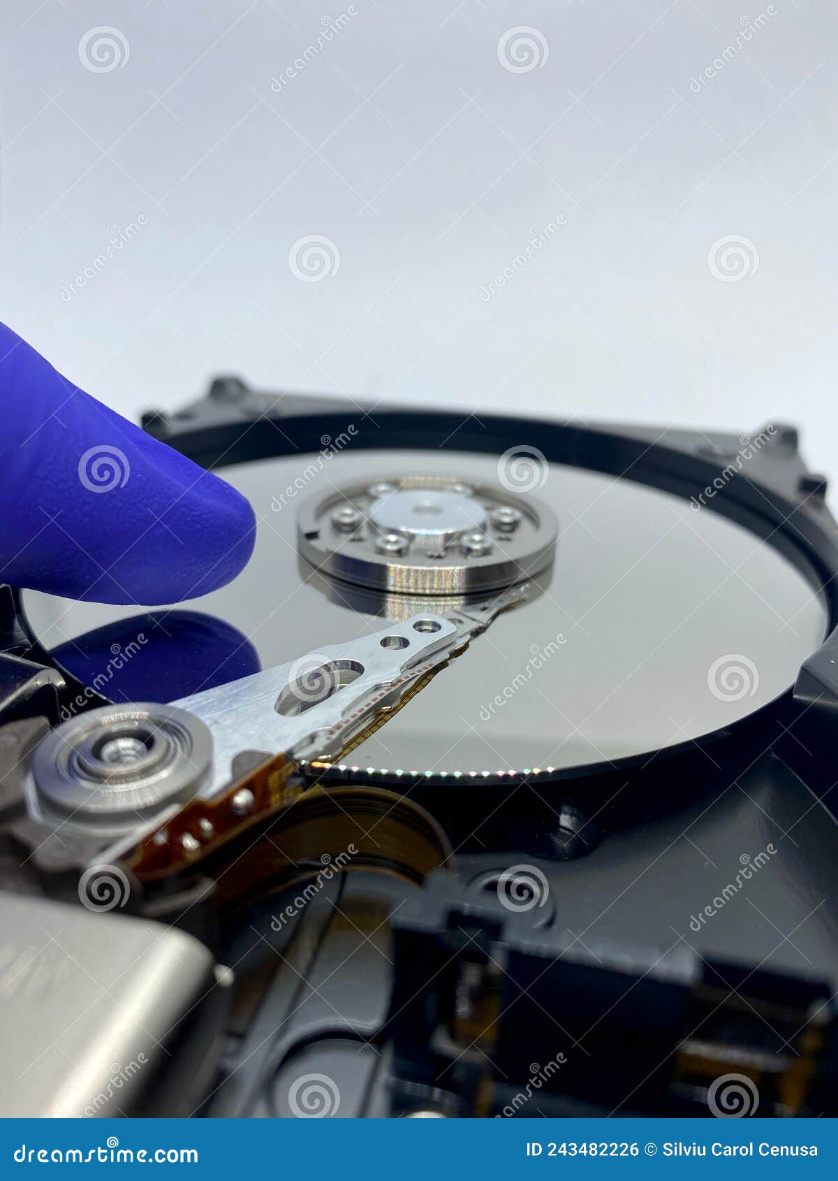 Hand on Hard Disk Plate Closeup View with Selective Focus on Foreground ...