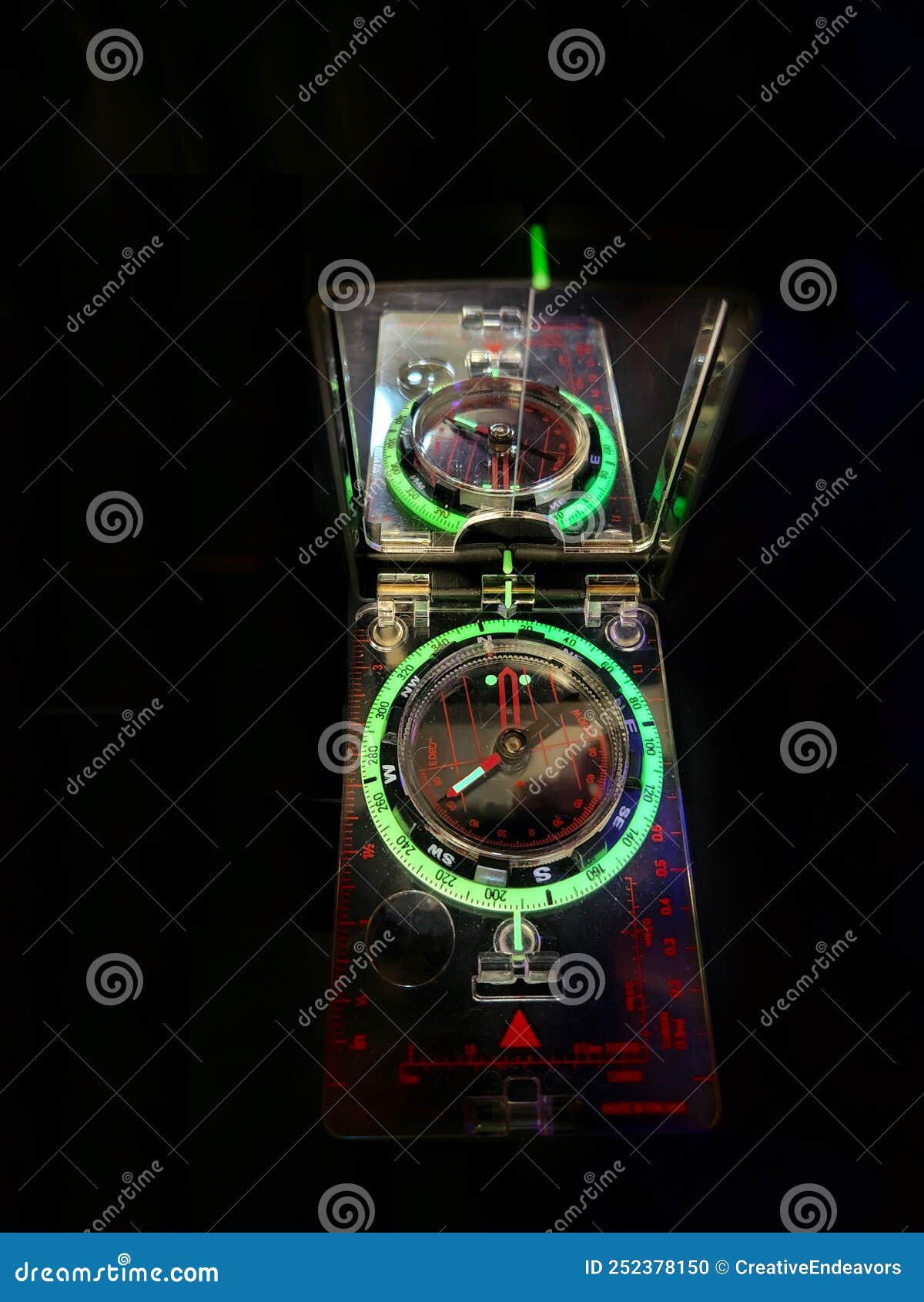 Hand-held Compass at Night with Glowing Dial Stock Photo - Image of ...