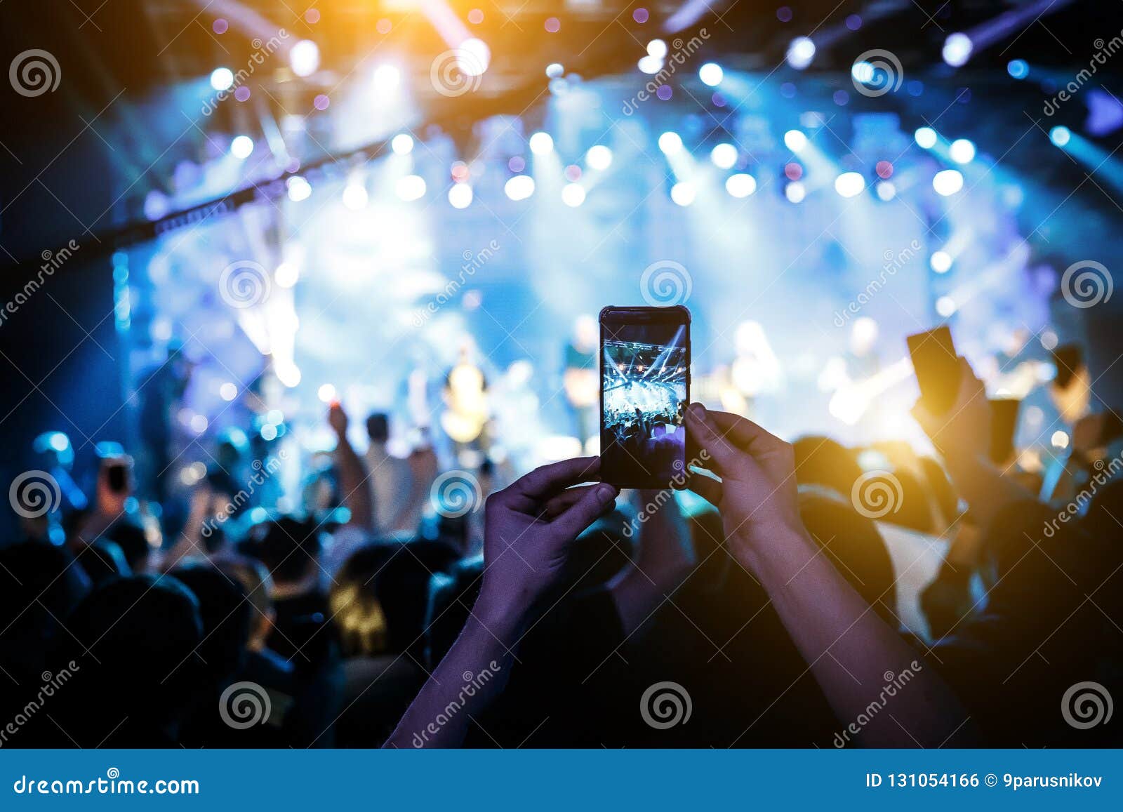 Hand Held Smart Phone Filming a Concert. Stock Photo - Image of mobile ...