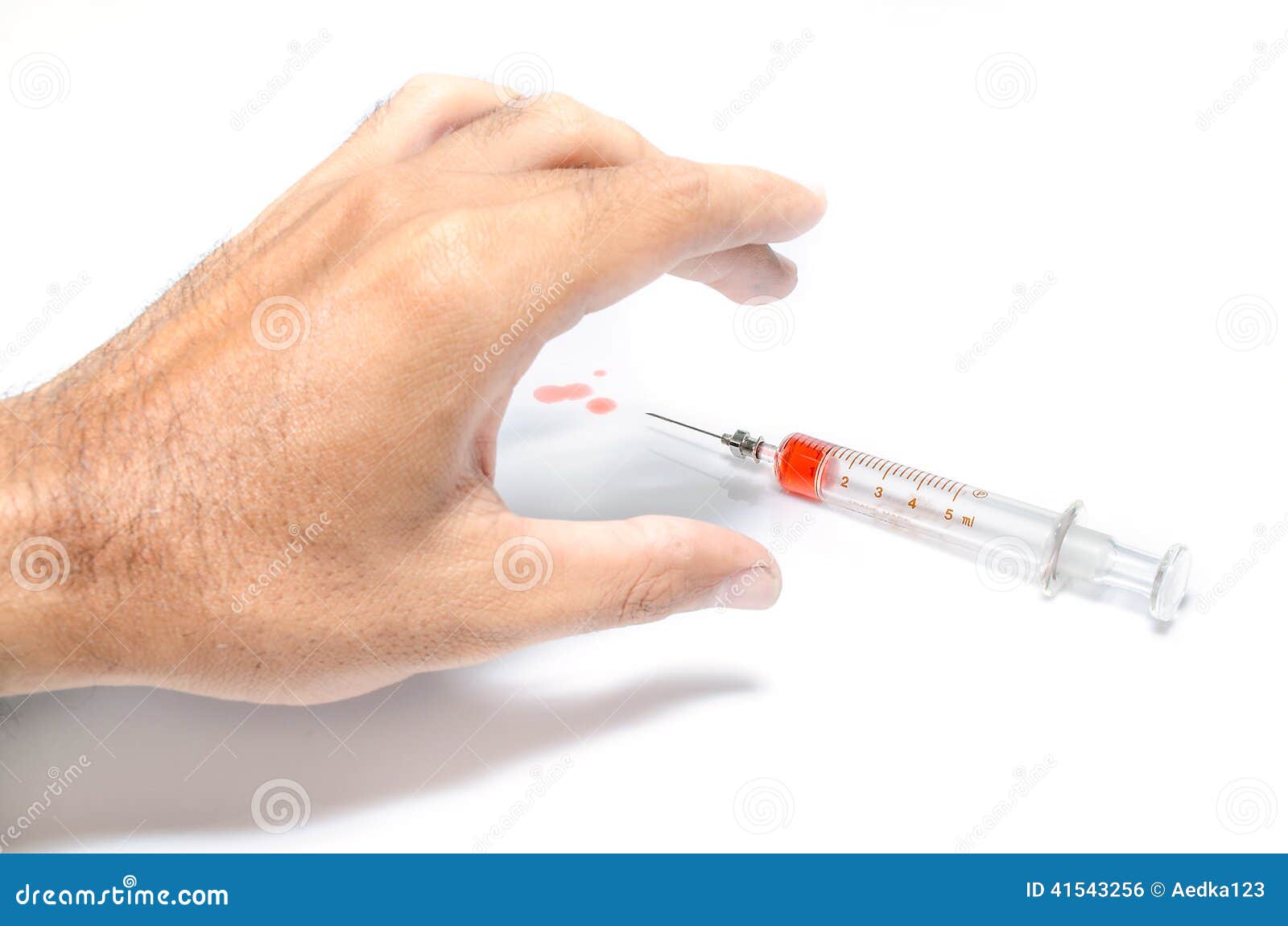 Hand with heroin syringe. stock photo. Image of heroin - 41543256