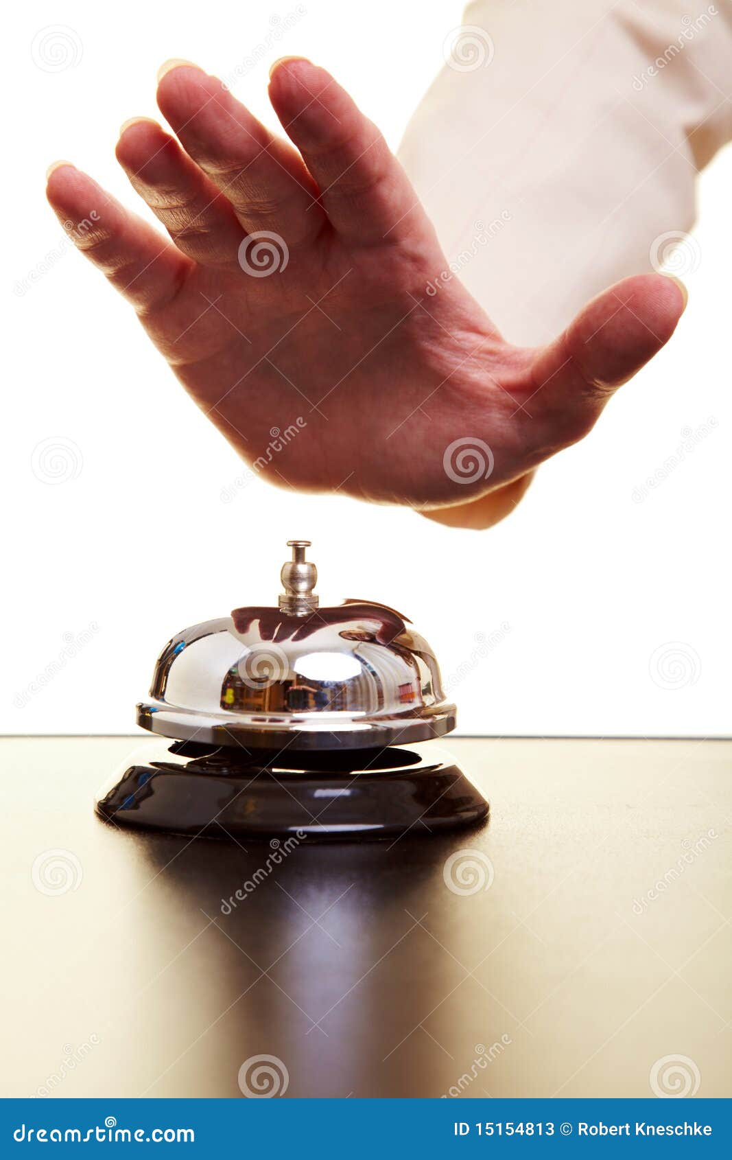 Hand hitting hotel bell stock image. Image of ringing - 15154813