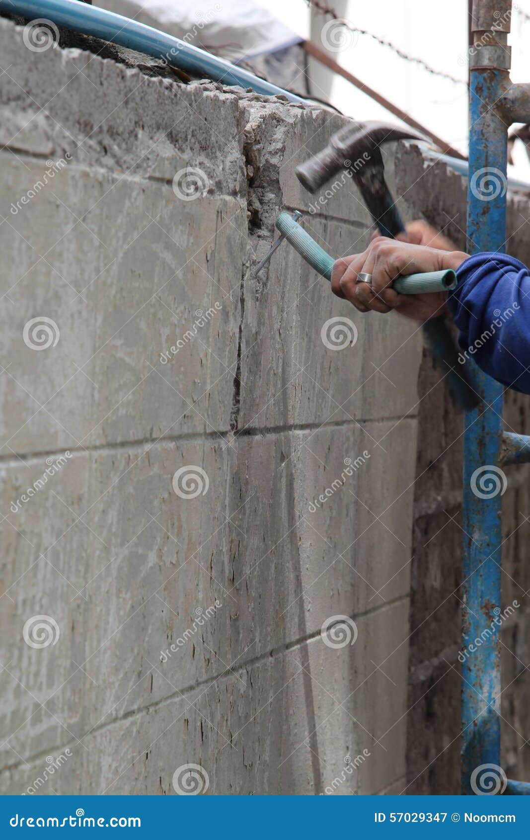 Hand hitting a nail stock image. Image of improvement - 57029347