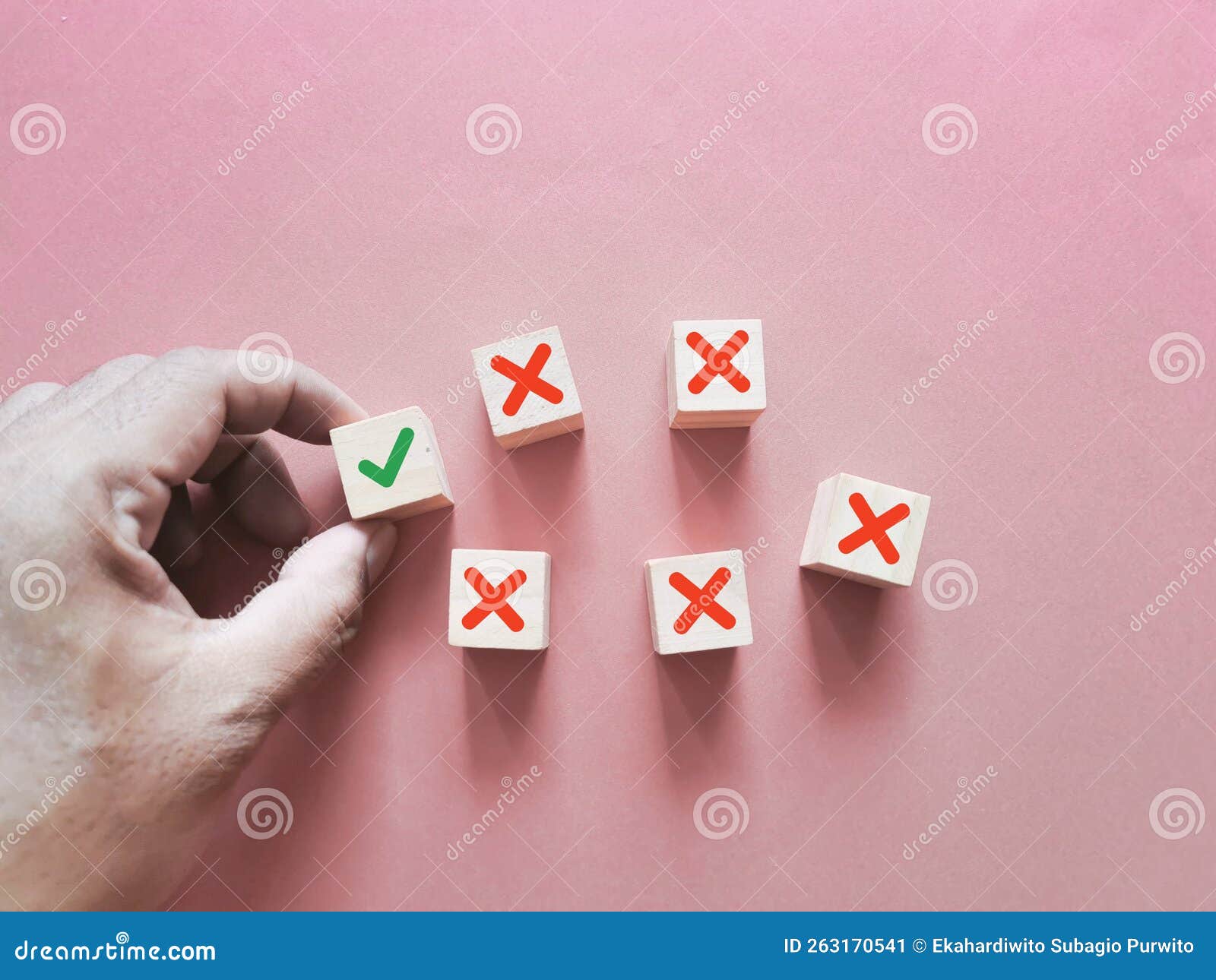 Hand Hold Check Mark and X Sign Symbol on Wooden Cubes. Correct or ...
