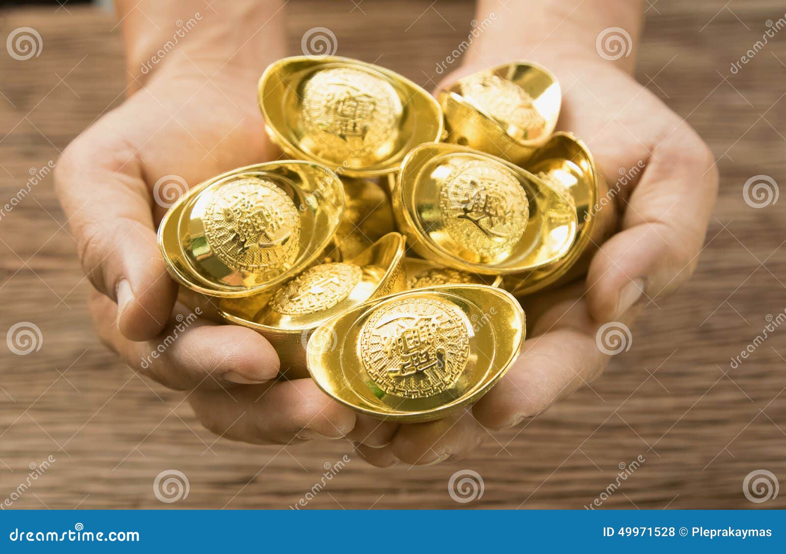 Hand hold chinese gold stock photo. Image of savings - 49971528