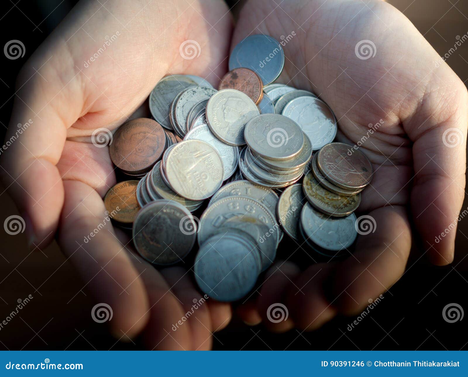 A Hand Hold Coins. Saving Money or Donation Concept Stock Photo - Image ...