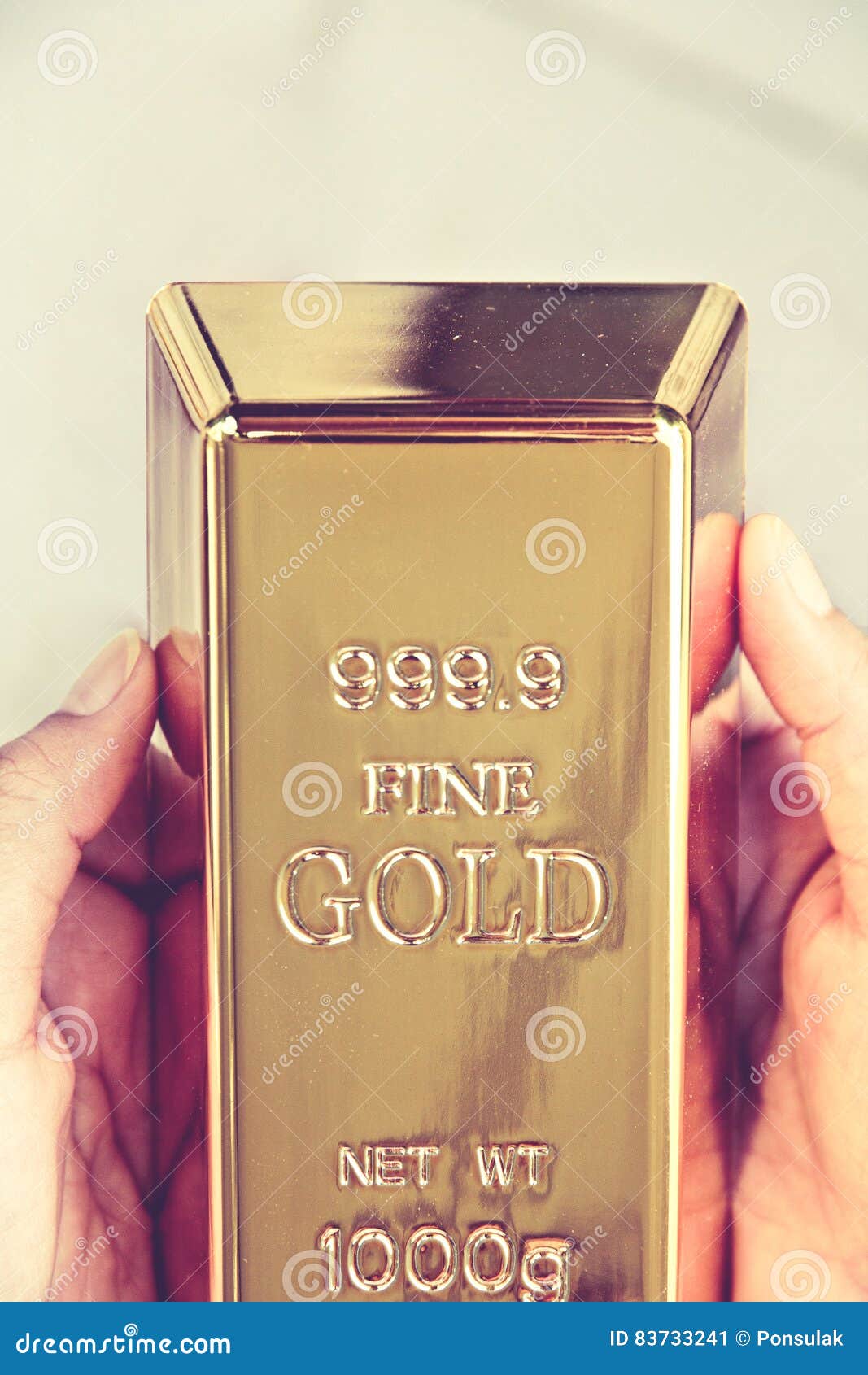 Hand hold gold bars stock image. Image of mathematical - 83733241
