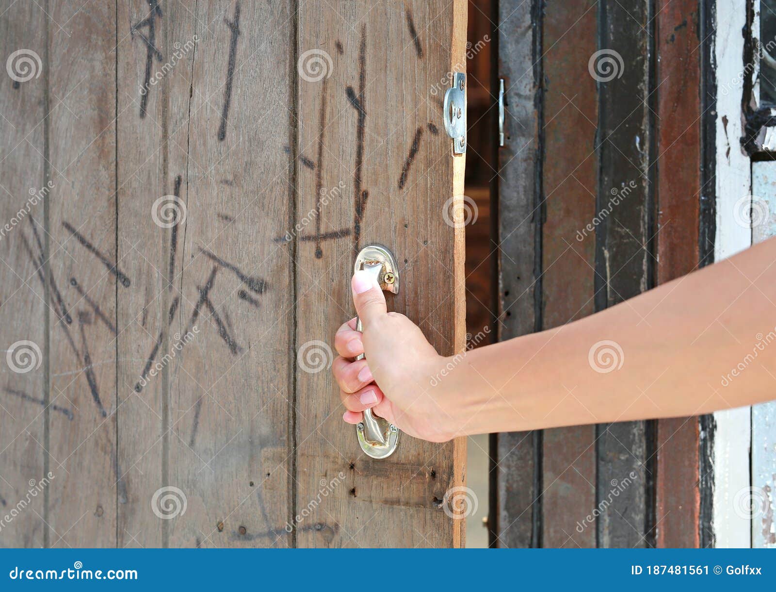 Hand Hold Handle of Wood Door To Open or Close Stock Image - Image of ...