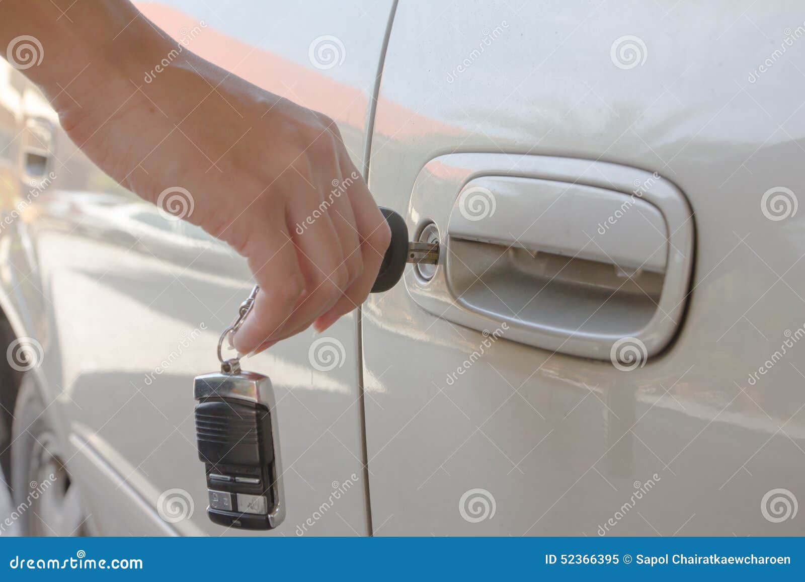 Hand hold key unlock car stock image. Image of clear - 52366395