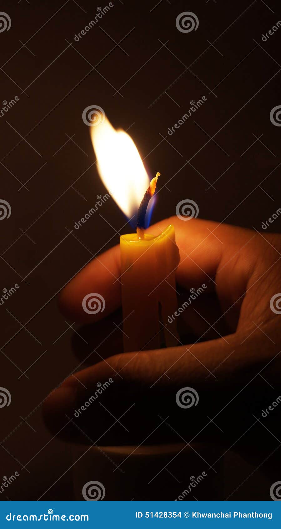 Hand hold light of candle stock photo. Image of care - 51428354