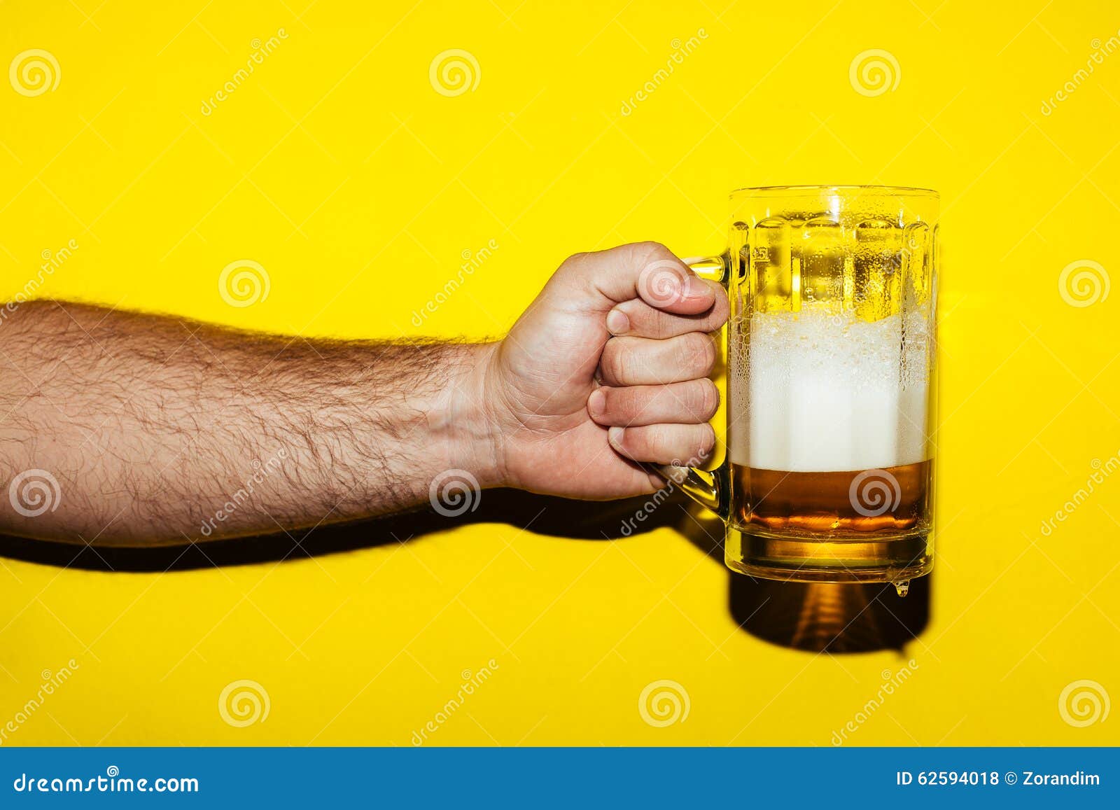 Hand hold mug of beer stock photo. Image of cheers, woman - 62594018