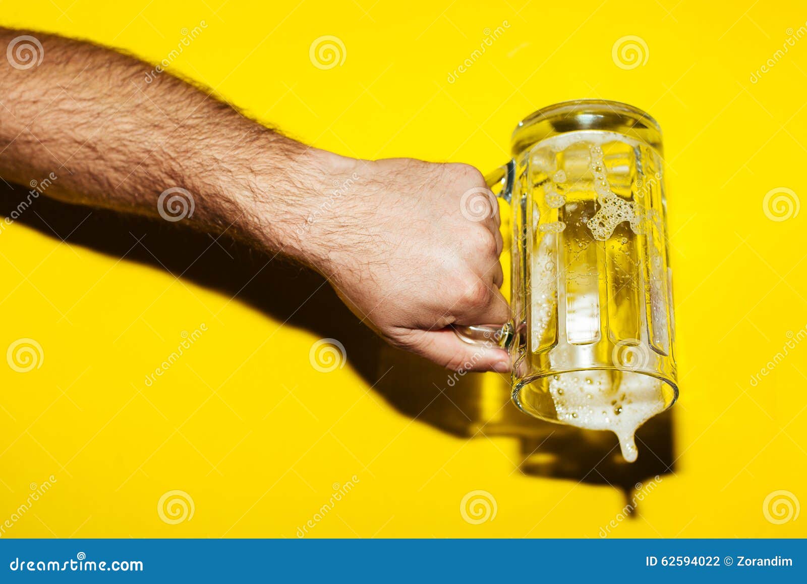Hand hold mug of beer stock photo. Image of background - 62594022