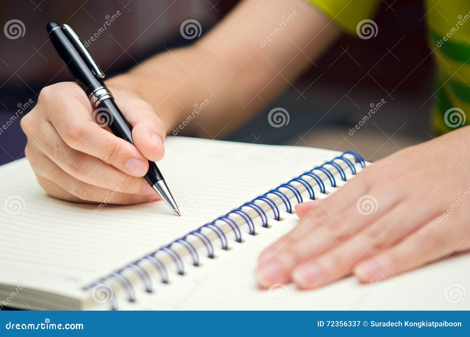 Hand Hold a Pen and Write on a Book Stock Image - Image of letter, hand ...