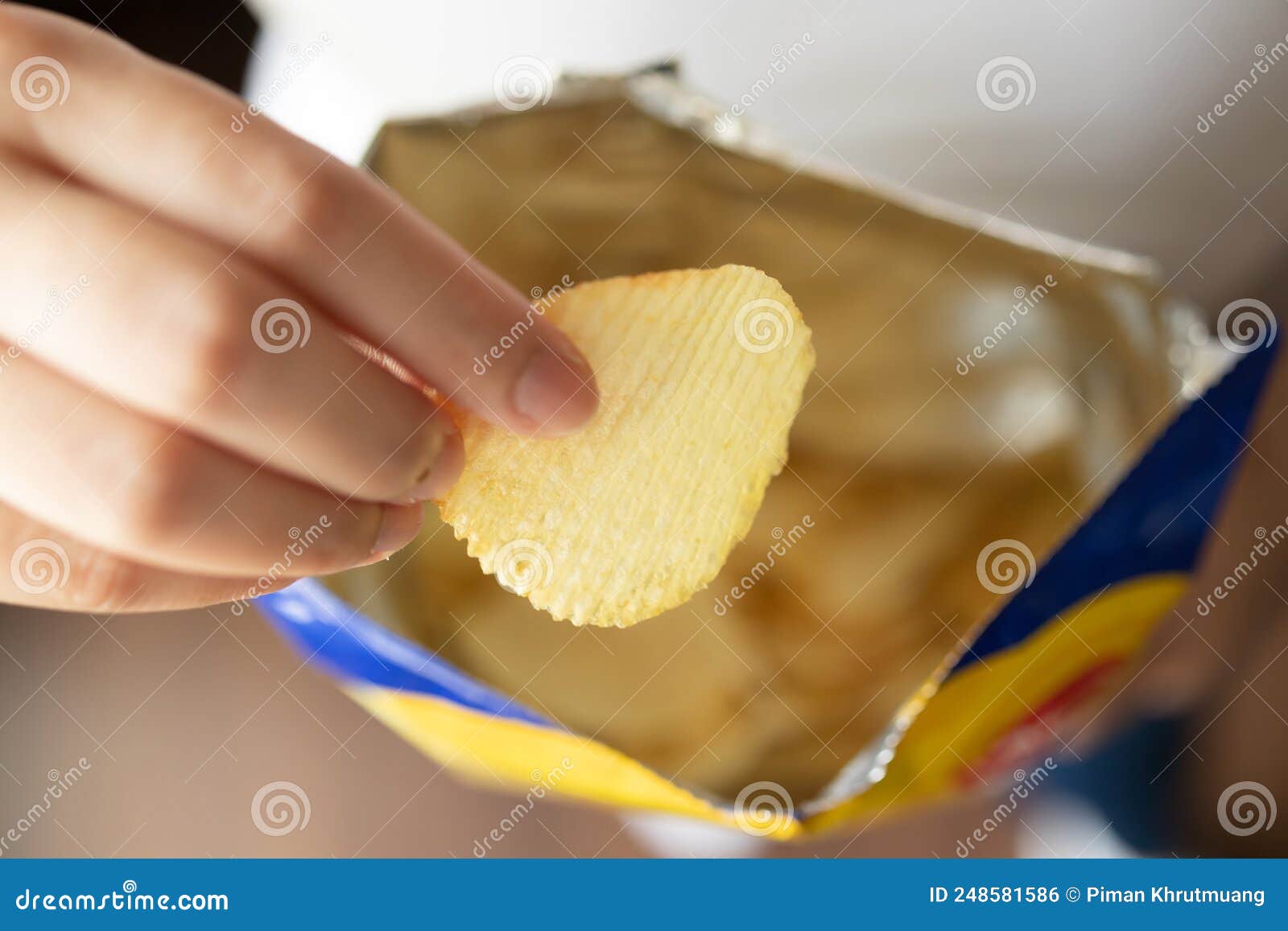 Hand Hold Potato Chips with Snack Bag Stock Photo - Image of chips ...
