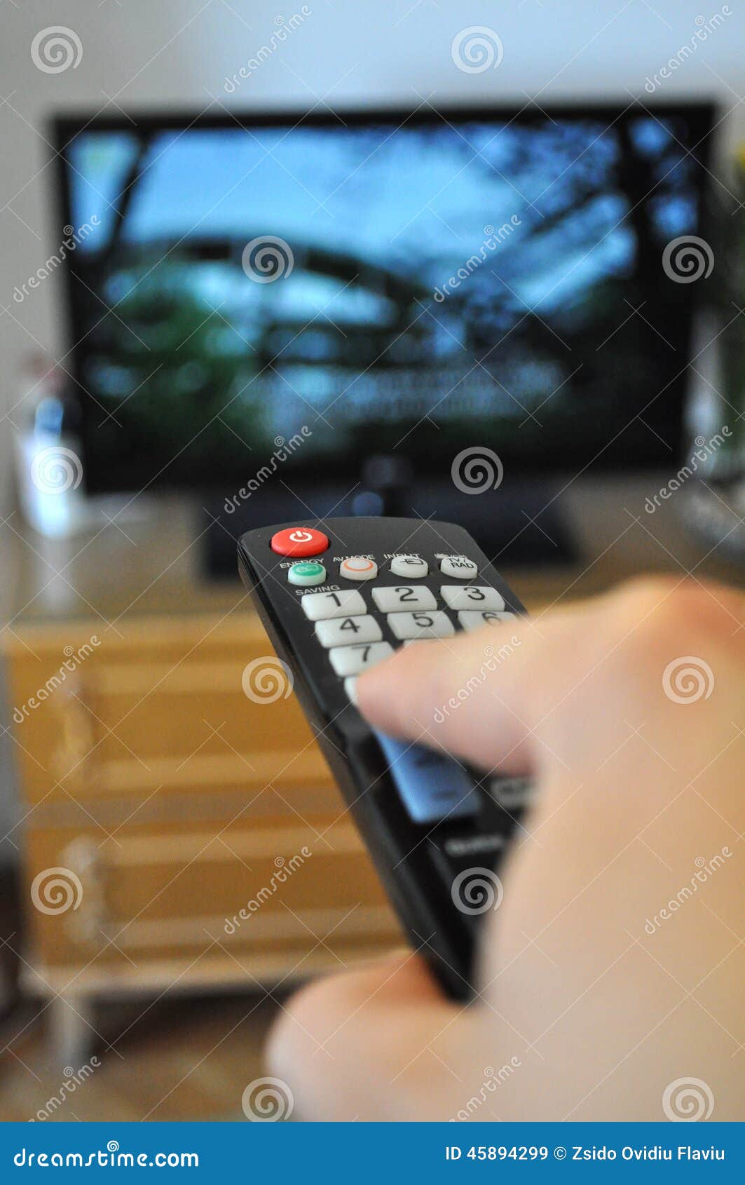 Hand hold remote control stock image. Image of leisure - 45894299
