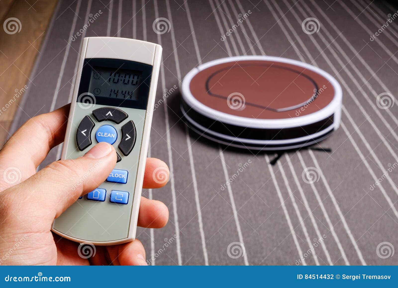 Hand Hold Remote Control for Robotic Vacuum Cleaner Stock Photo - Image ...