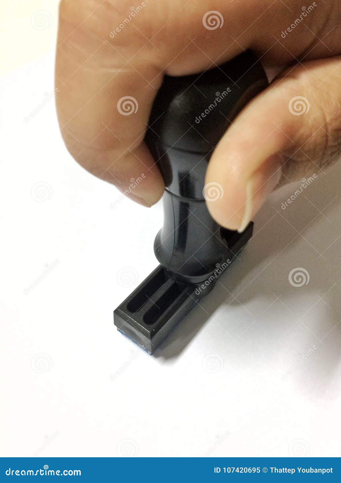 Hand hold rubber stamper. stock image. Image of laptop - 107420695
