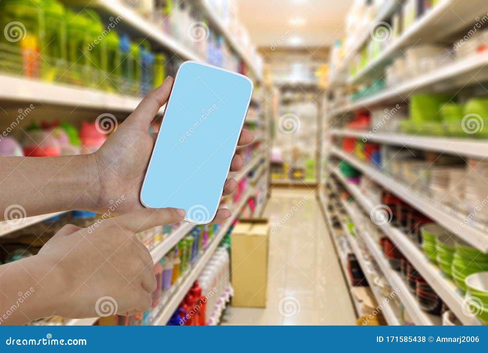 Hand Hold a Smart Phone To Buy or Pay Money at Supermarket . Technology ... Hand Hold a Smart Phone To Buy or Pay Money at Supermarket . Technology ...