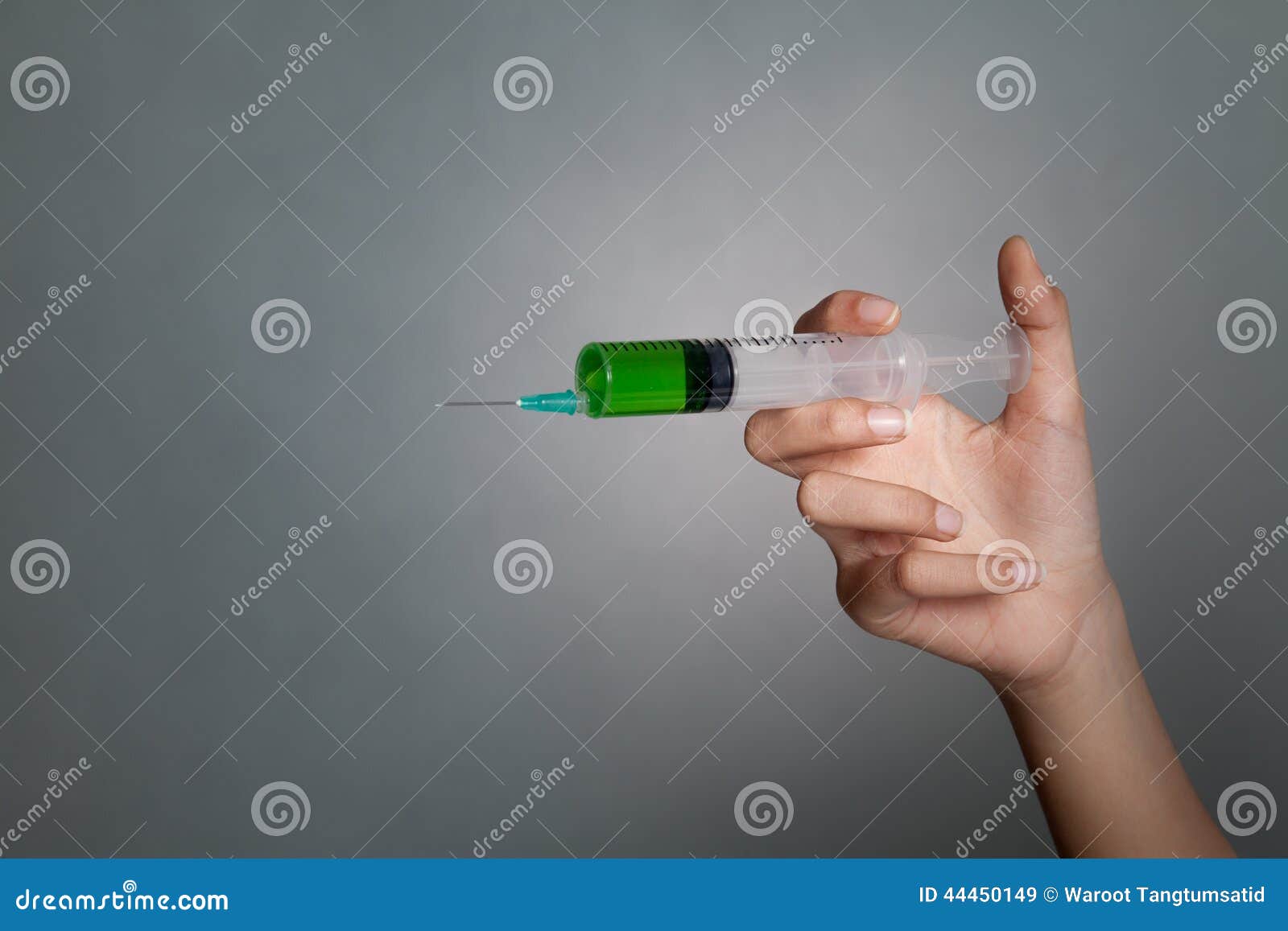 Hand hold syringe stock image. Image of green, needle - 44450149