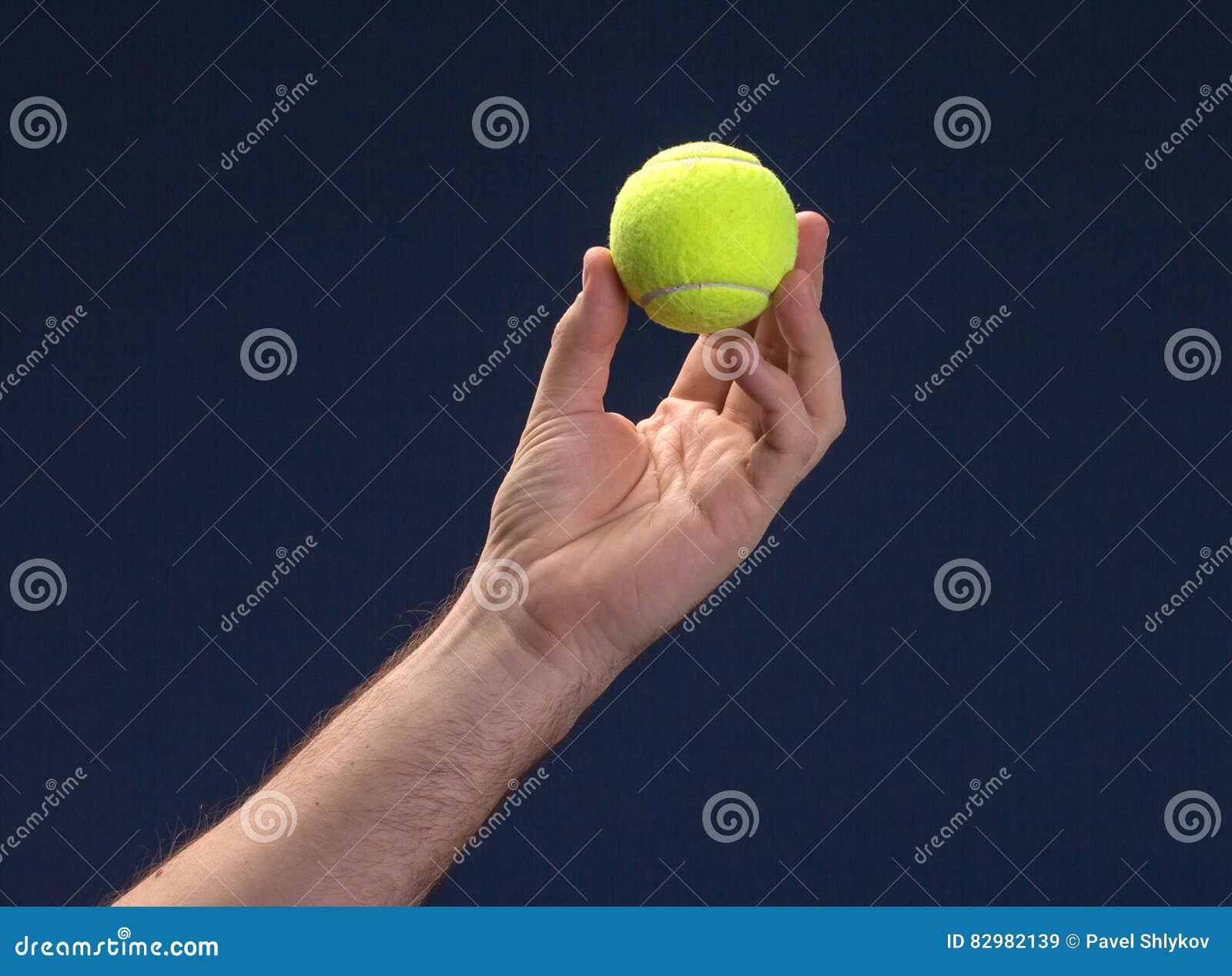 Hand hold Tennis ball stock image. Image of detail, close - 82982139