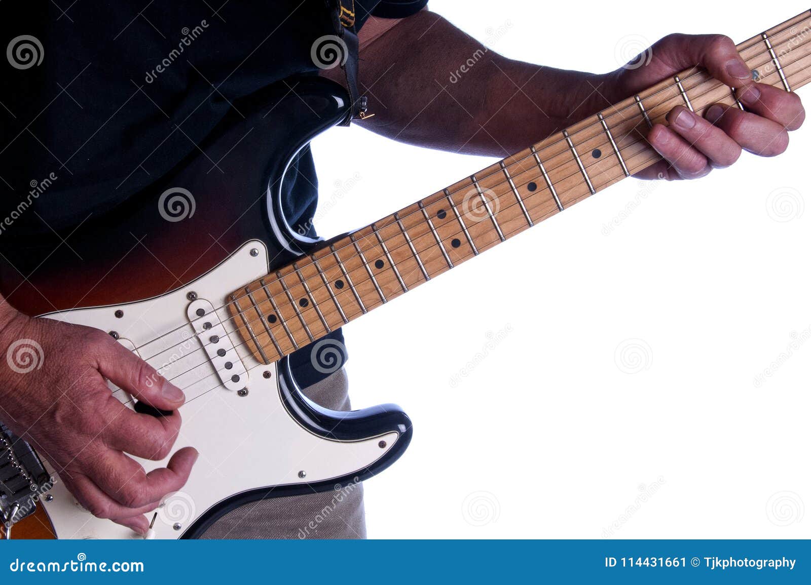 A hand holding a guitar stock image. Image of performer - 114431661