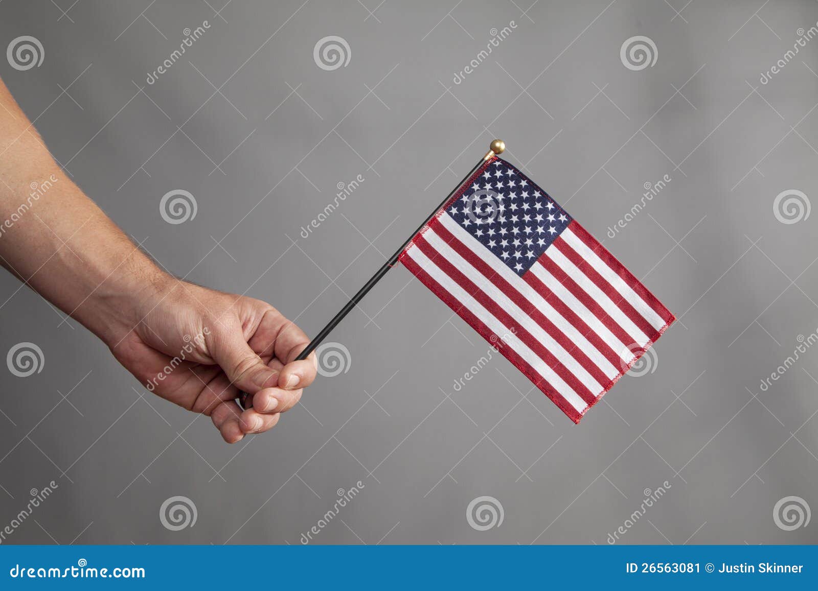 Hand Holding American Flag stock image. Image of states - 26563081