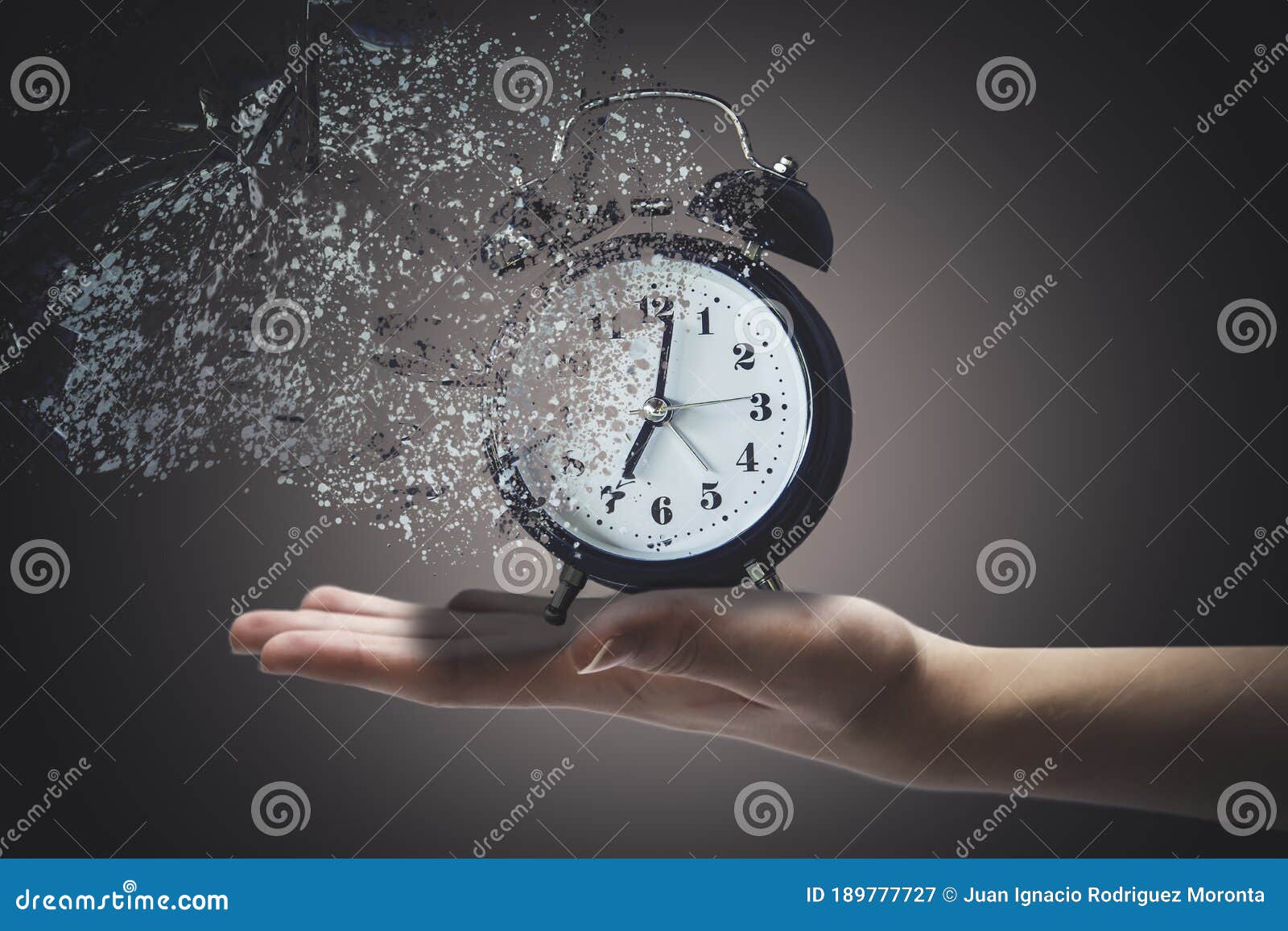 Hand Holding Analog Clock with Scatter Effect Stock Image - Image of ...