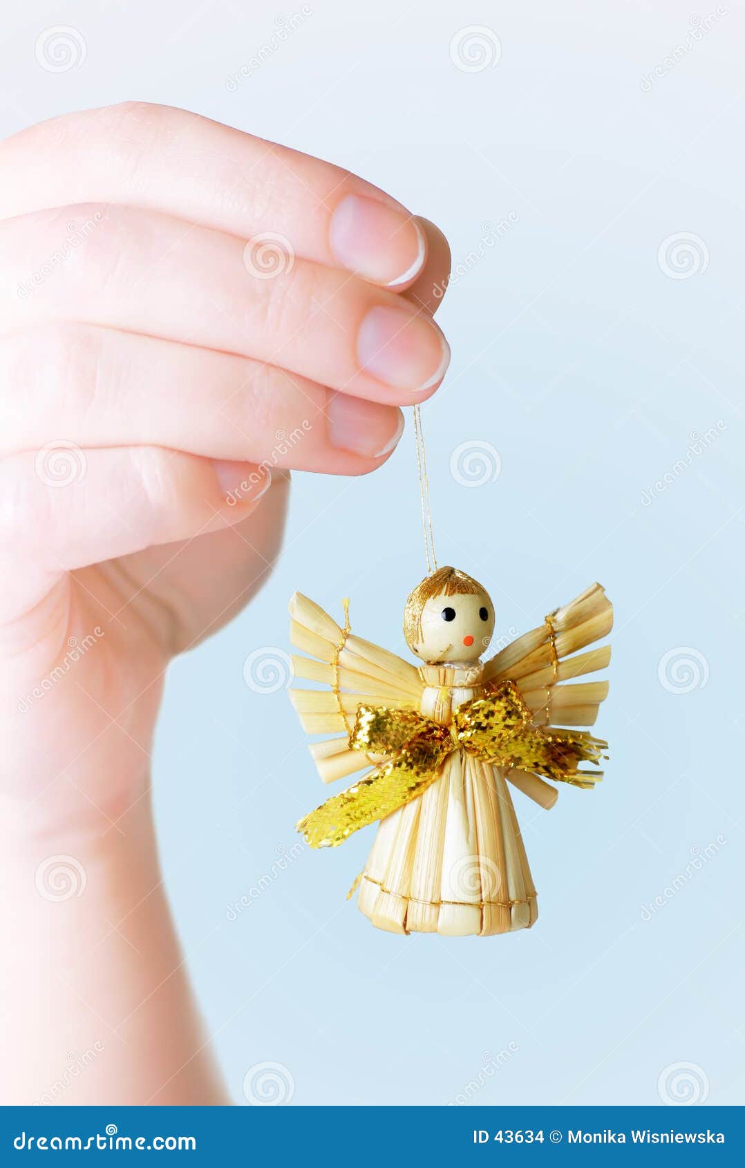 Hand Holding Angel Ornament Stock Photo - Image of hands, festive: 43634