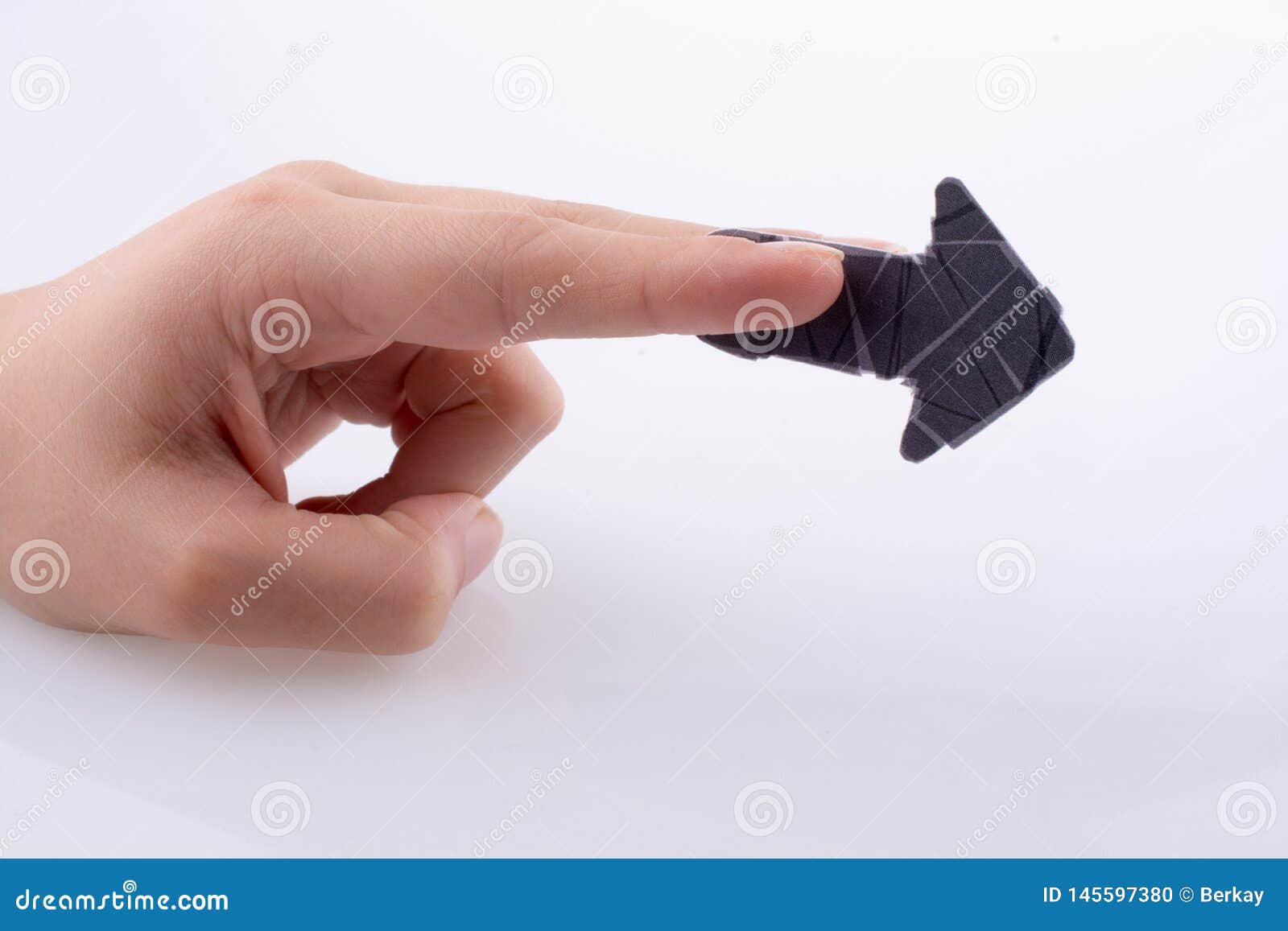 Hand holding an arrow stock photo. Image of arrow, hand - 145597380
