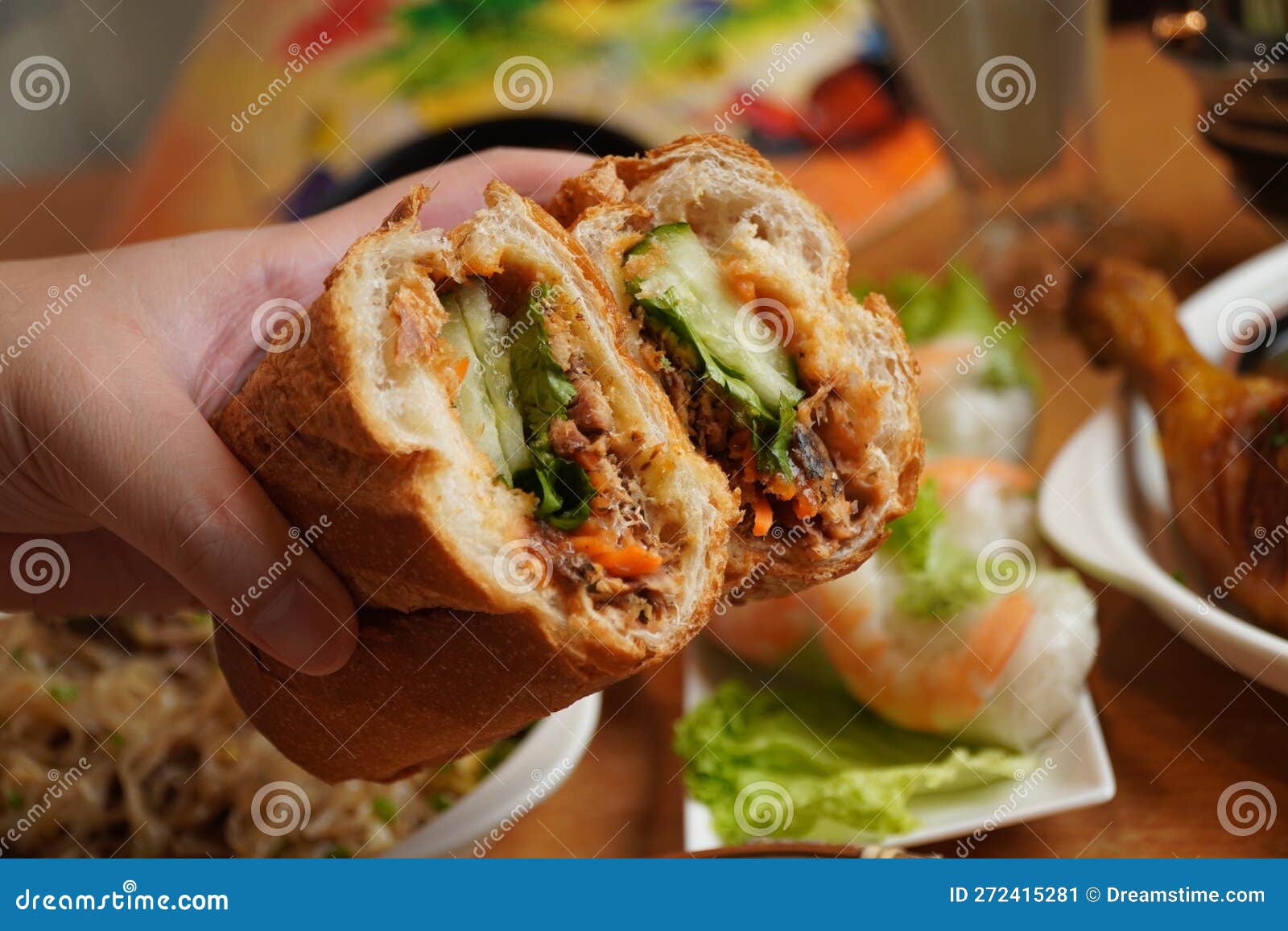 Hand Holding Bahn Mi stock image. Image of hand, meal - 272415281