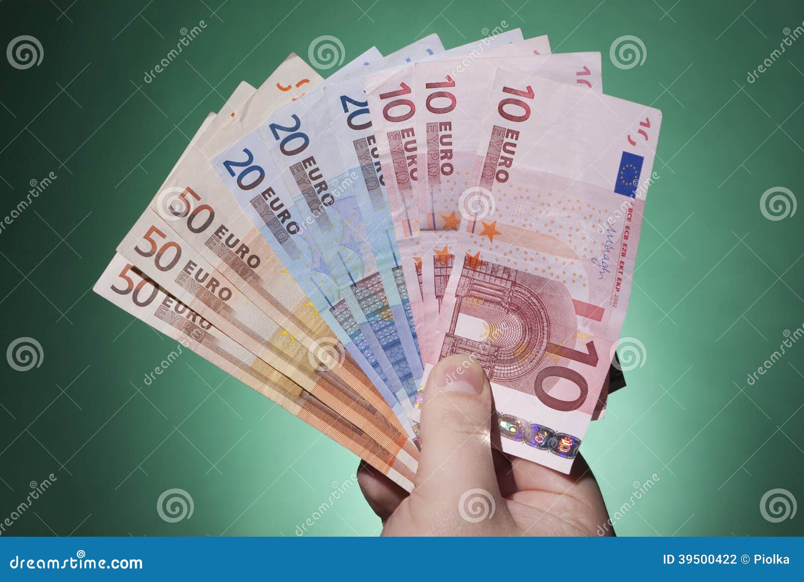 Hand holding bank notes stock photo. Image of hand, note - 39500422